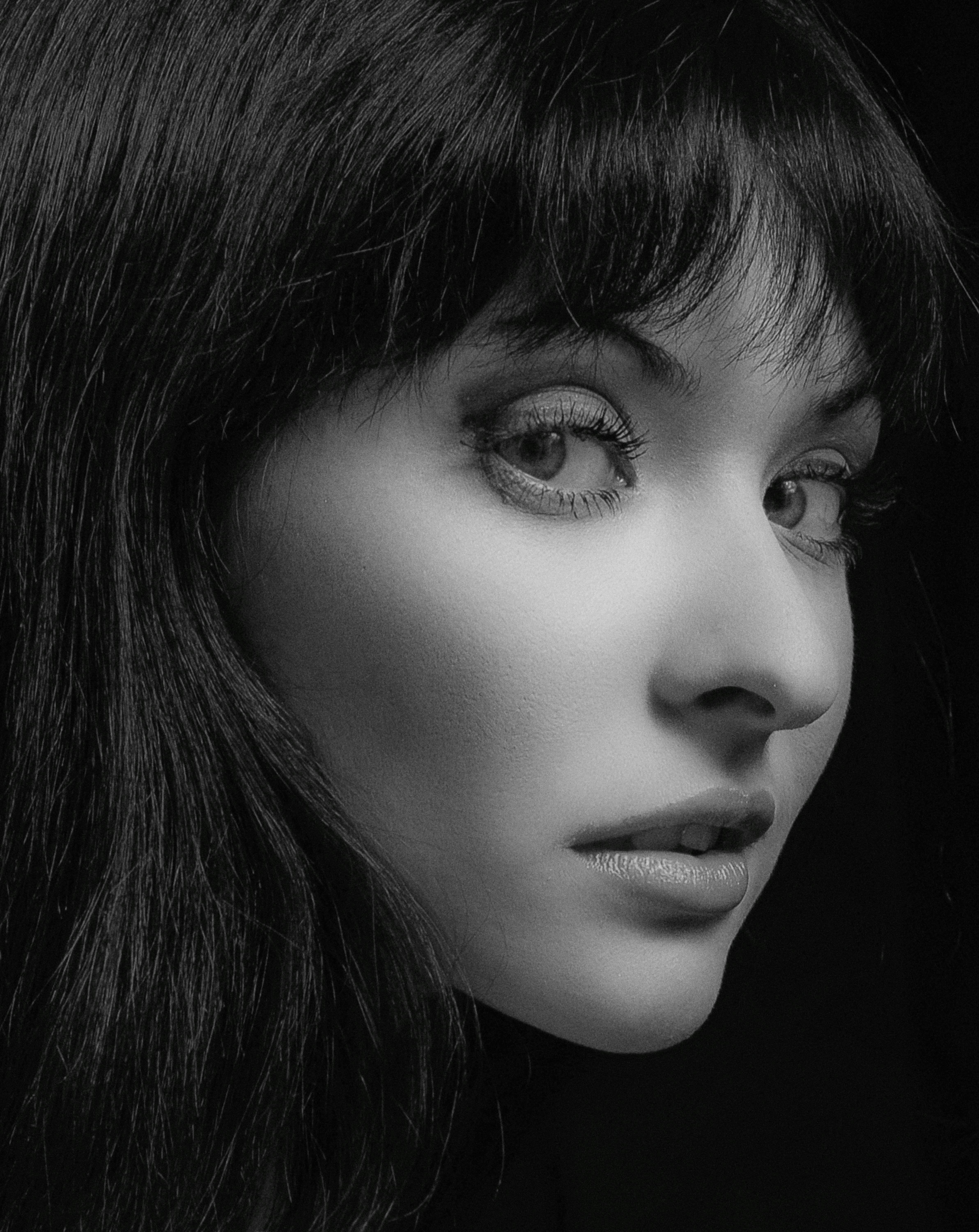 A Close-Up Shot of a Woman's Face · Free Stock Photo