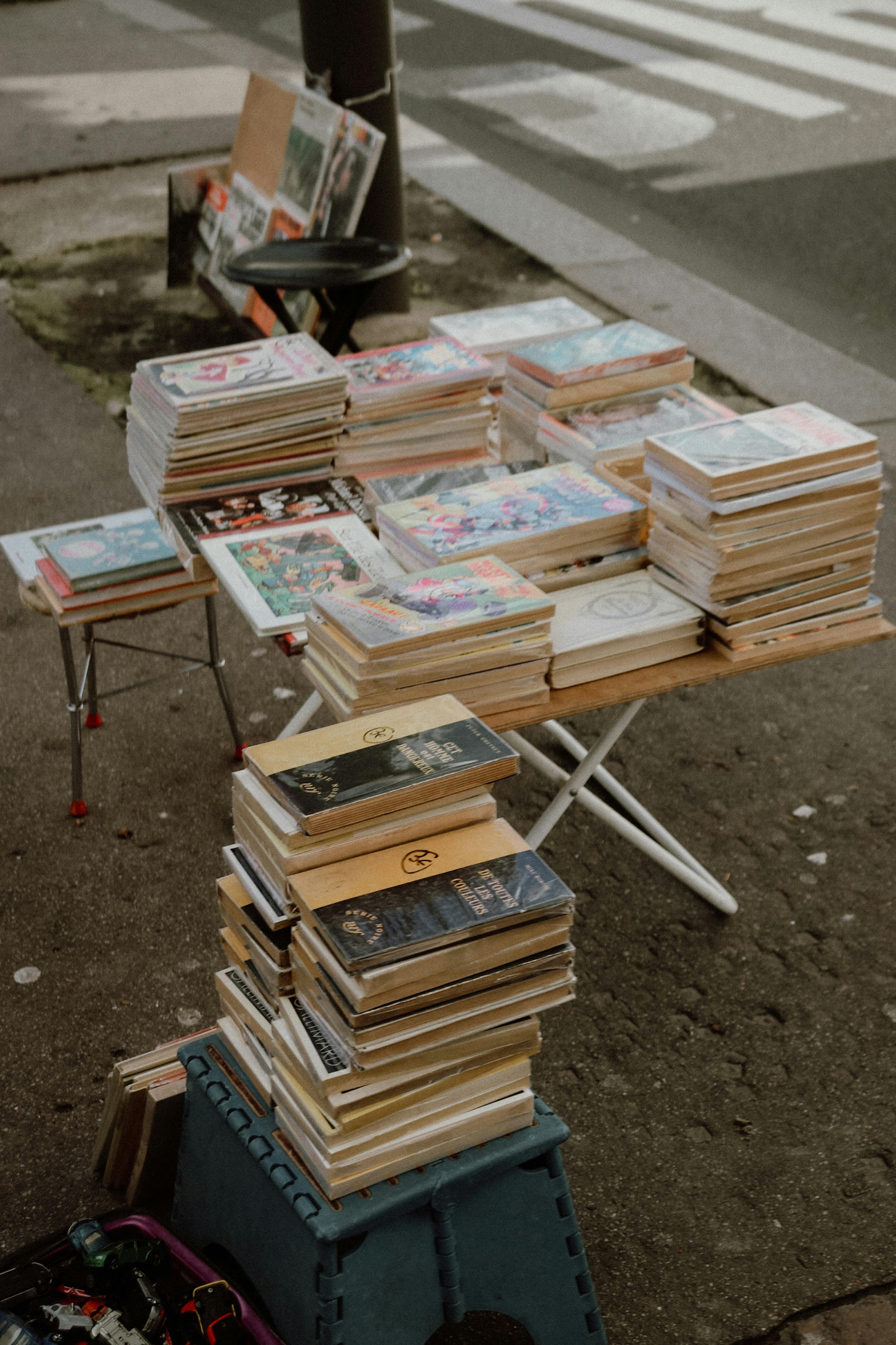 Stack of Books on Brown Wooden Table · Free Stock Photo