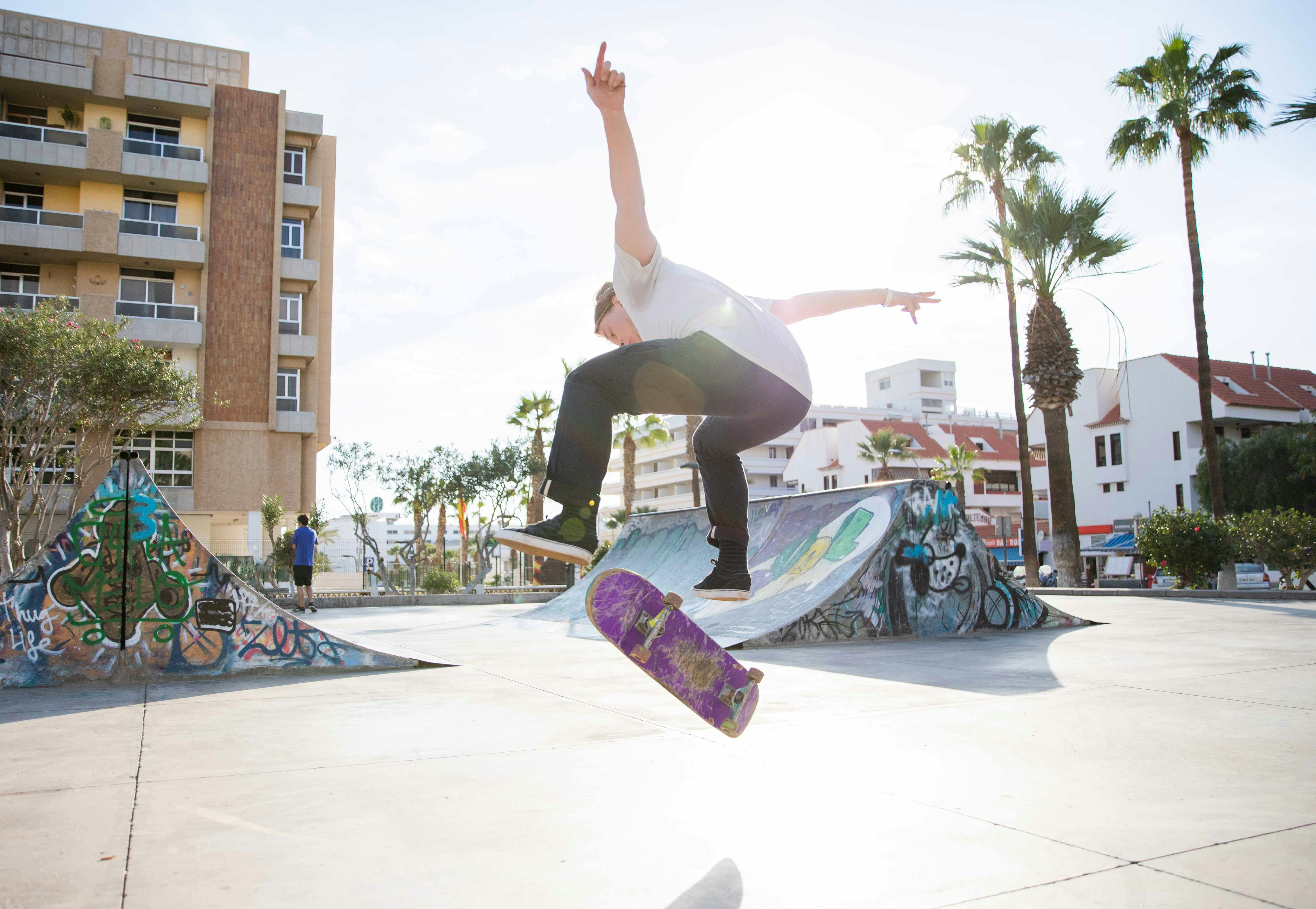 Man Skateboard Grinding on Rail · Free Stock Photo
