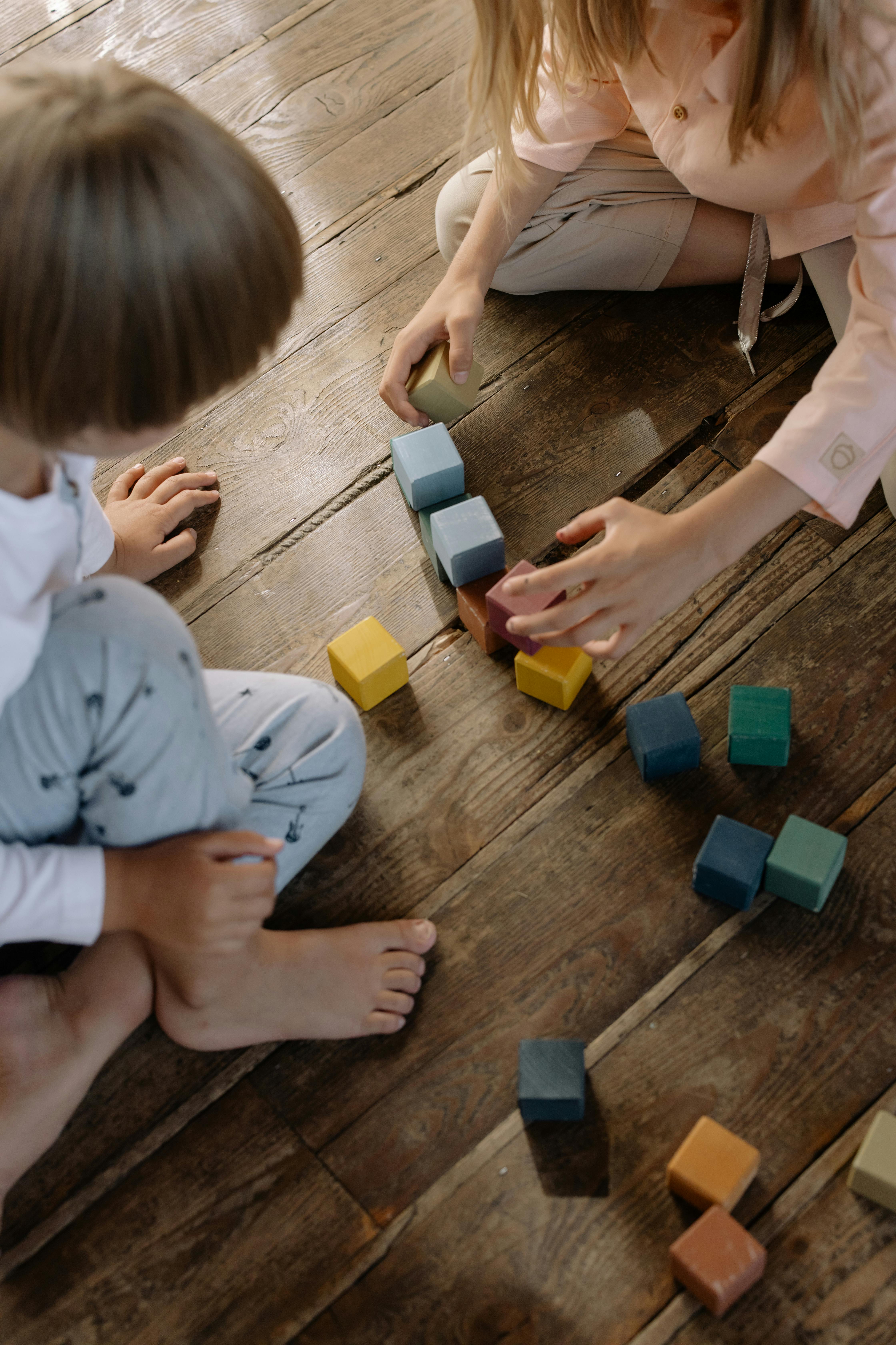 Kids Playing Colorful Cubes · Free Stock Photo