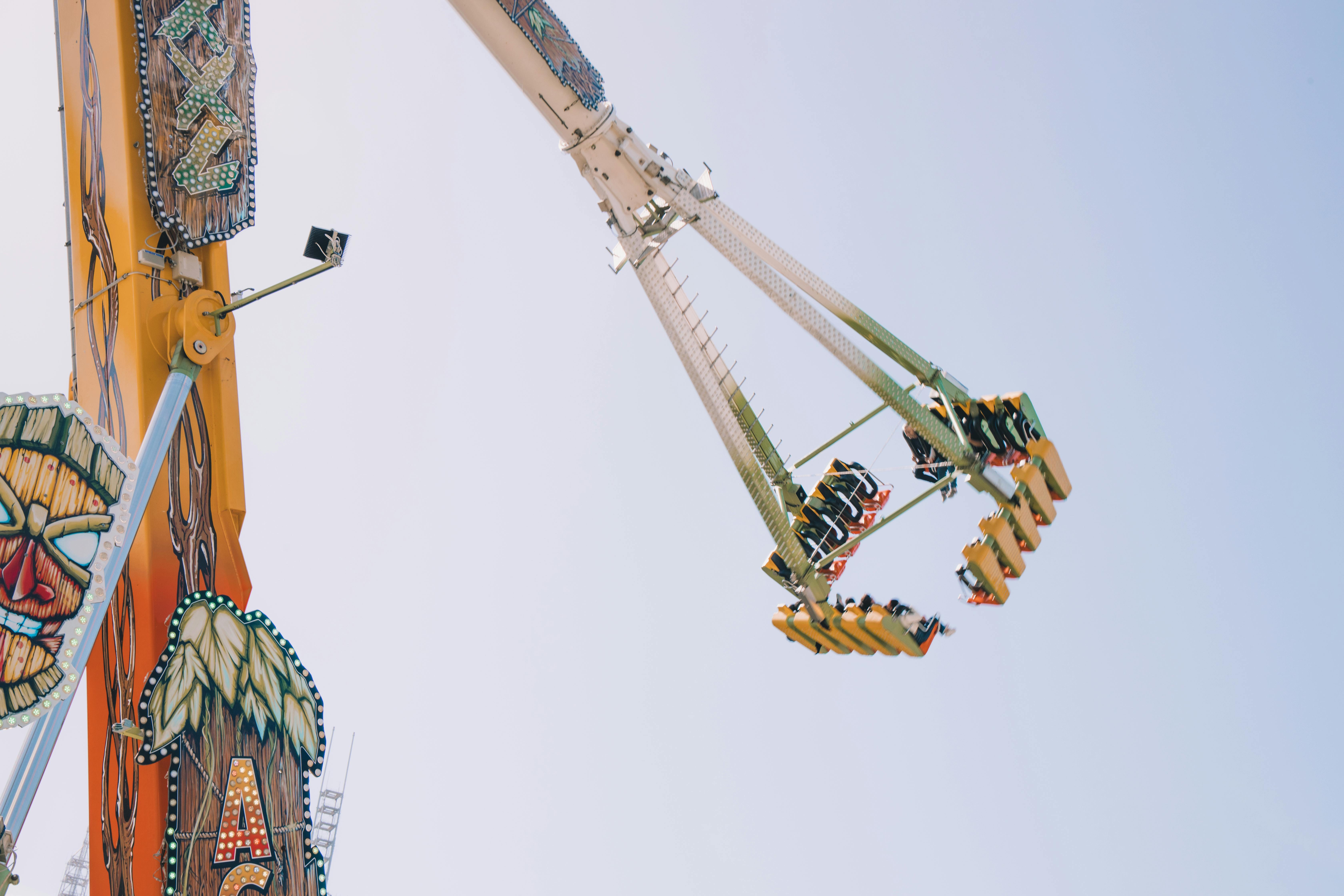 People Riding an Amusement Park Ride · Free Stock Photo