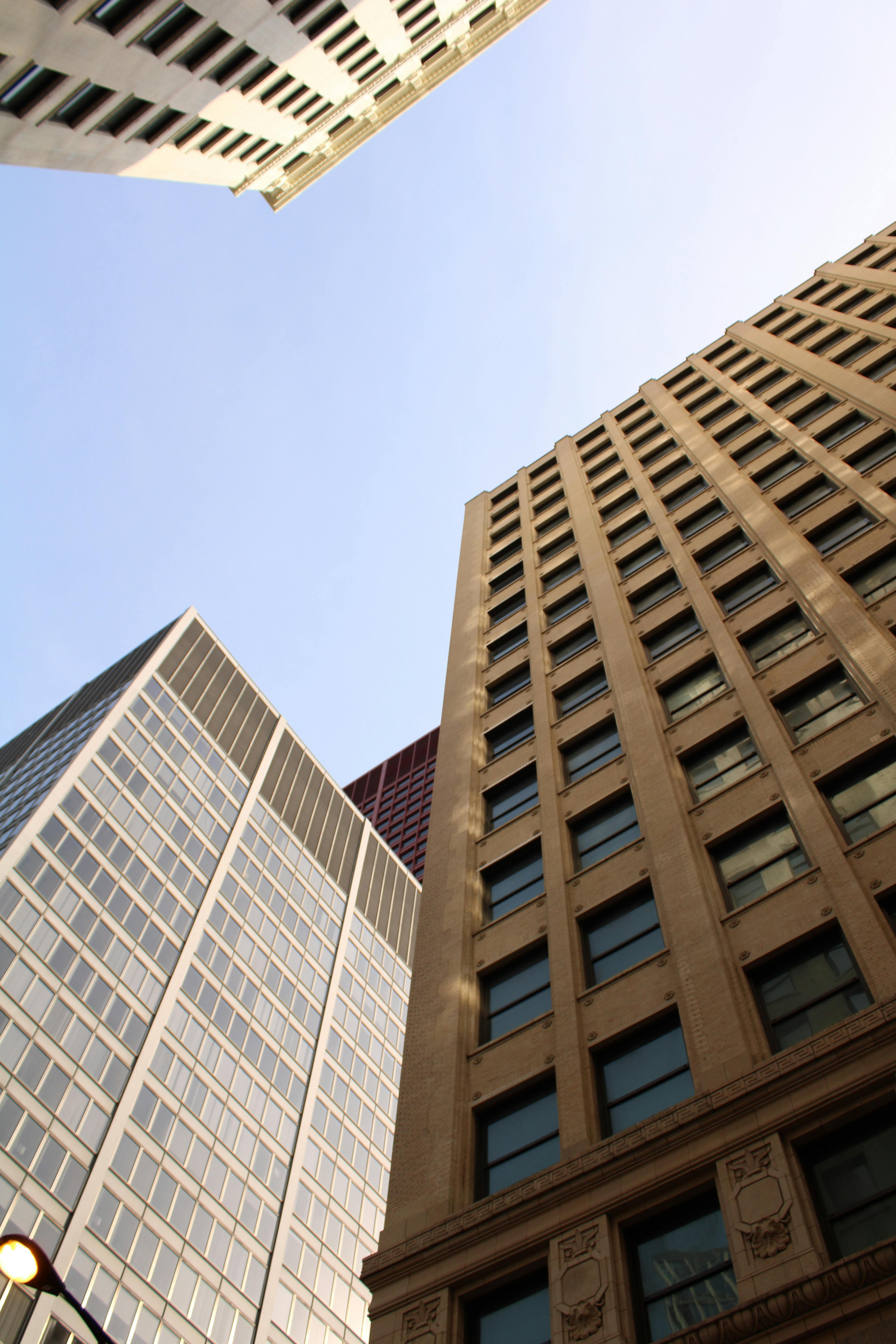 Low Angle Shot of Modern Skyscrapers · Free Stock Photo