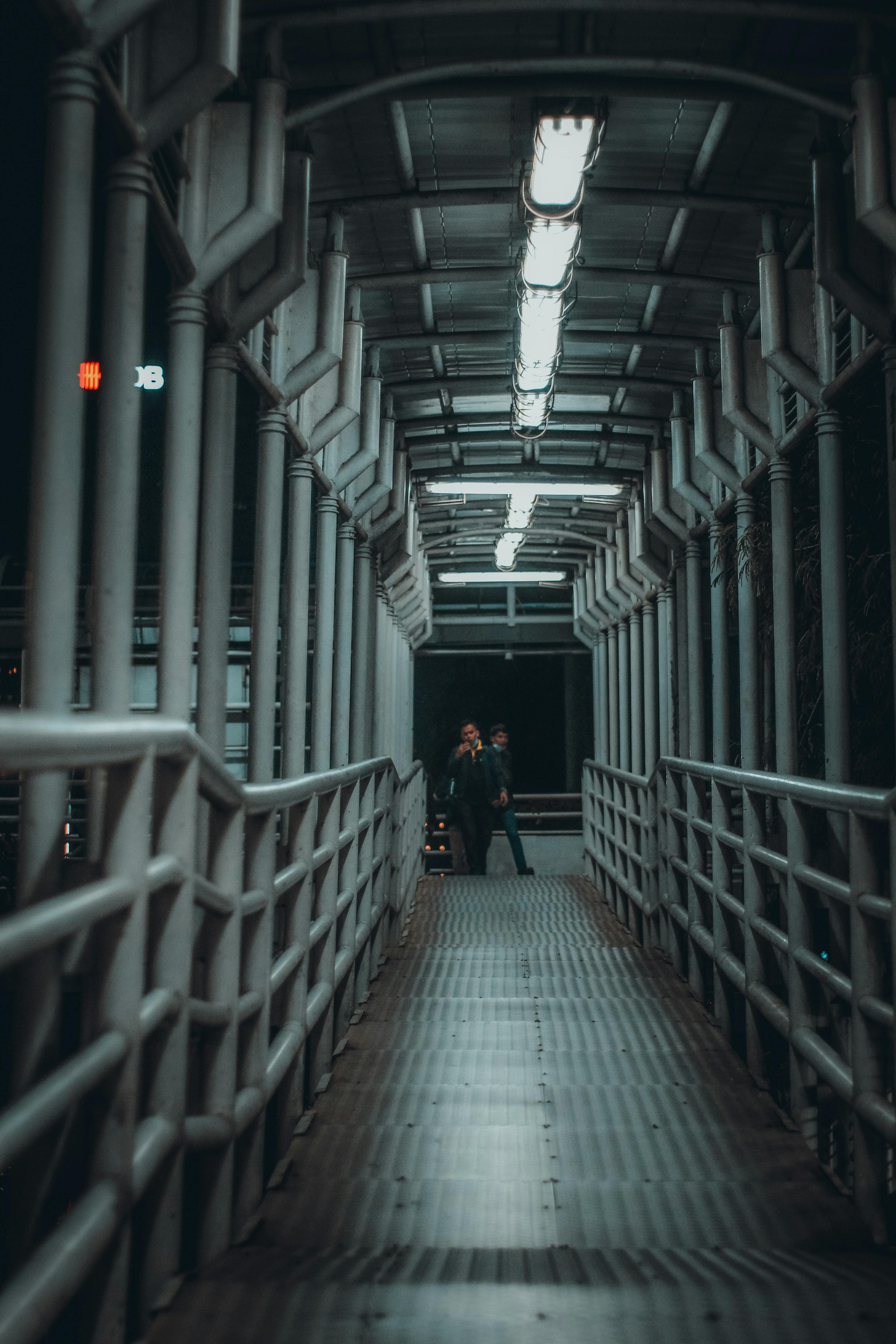 Man Walking on Overpass Bridge · Free Stock Photo