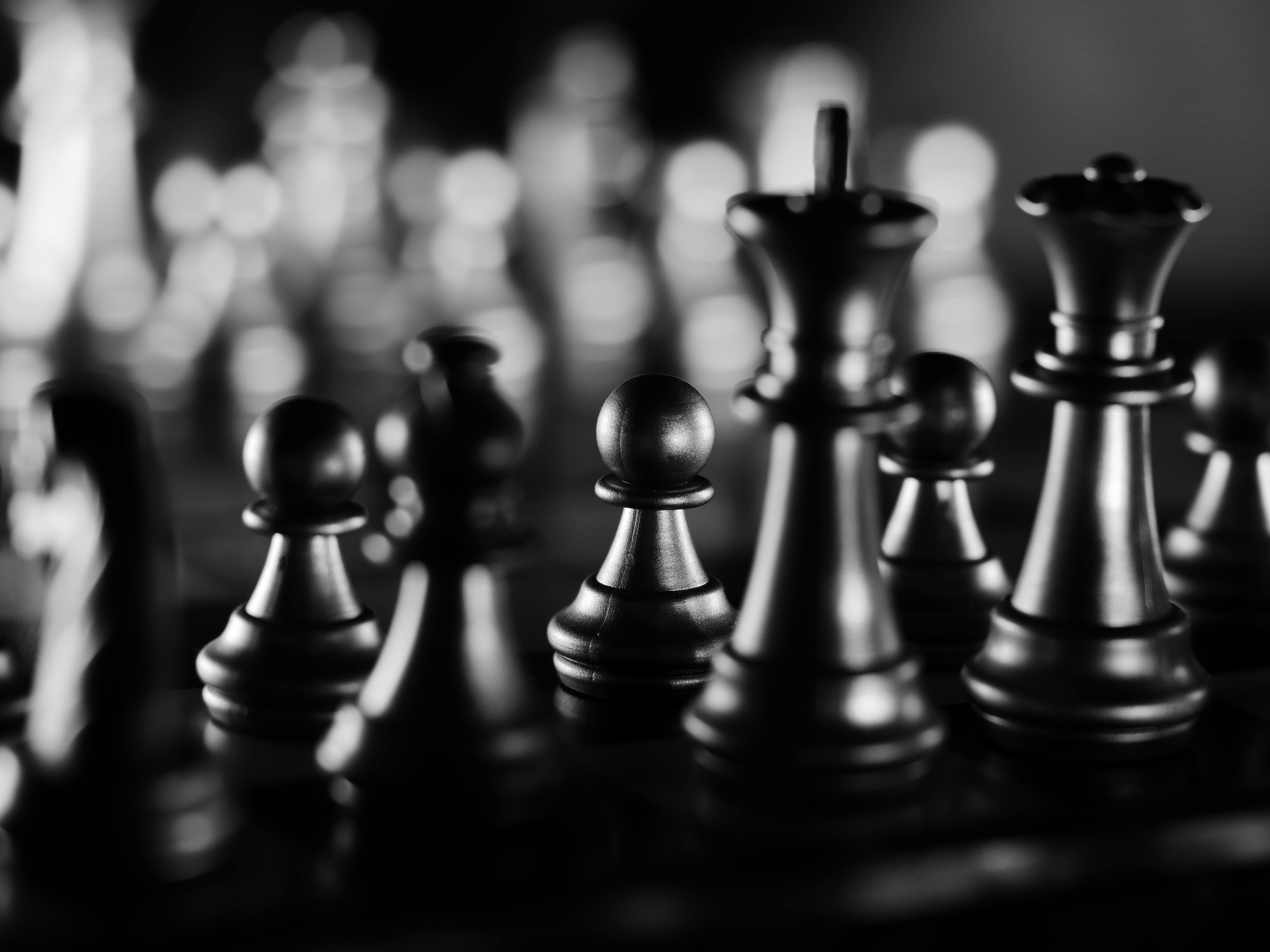 Grayscale Photo of Chess Pieces · Free Stock Photo