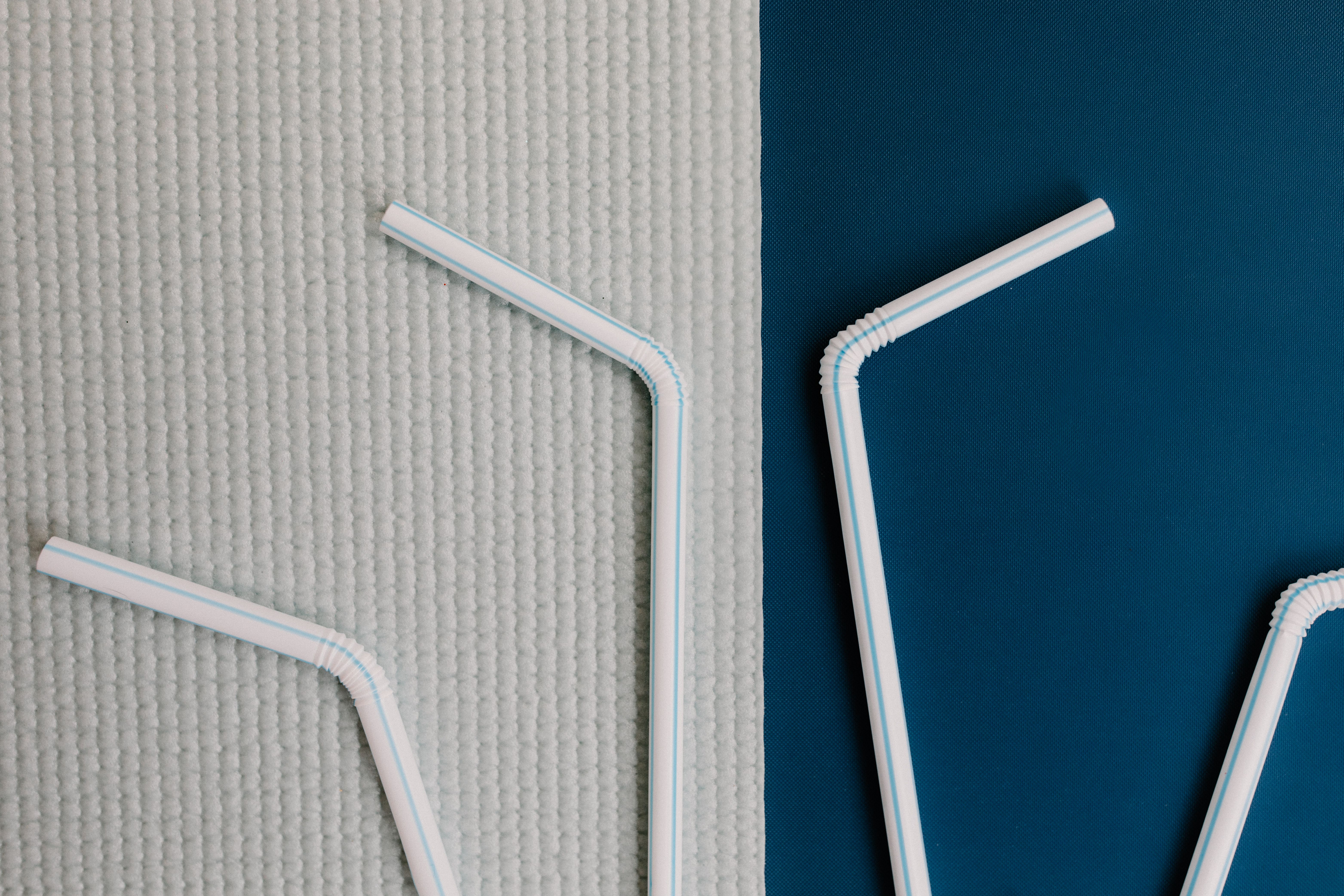 White and Blue Straws · Free Stock Photo
