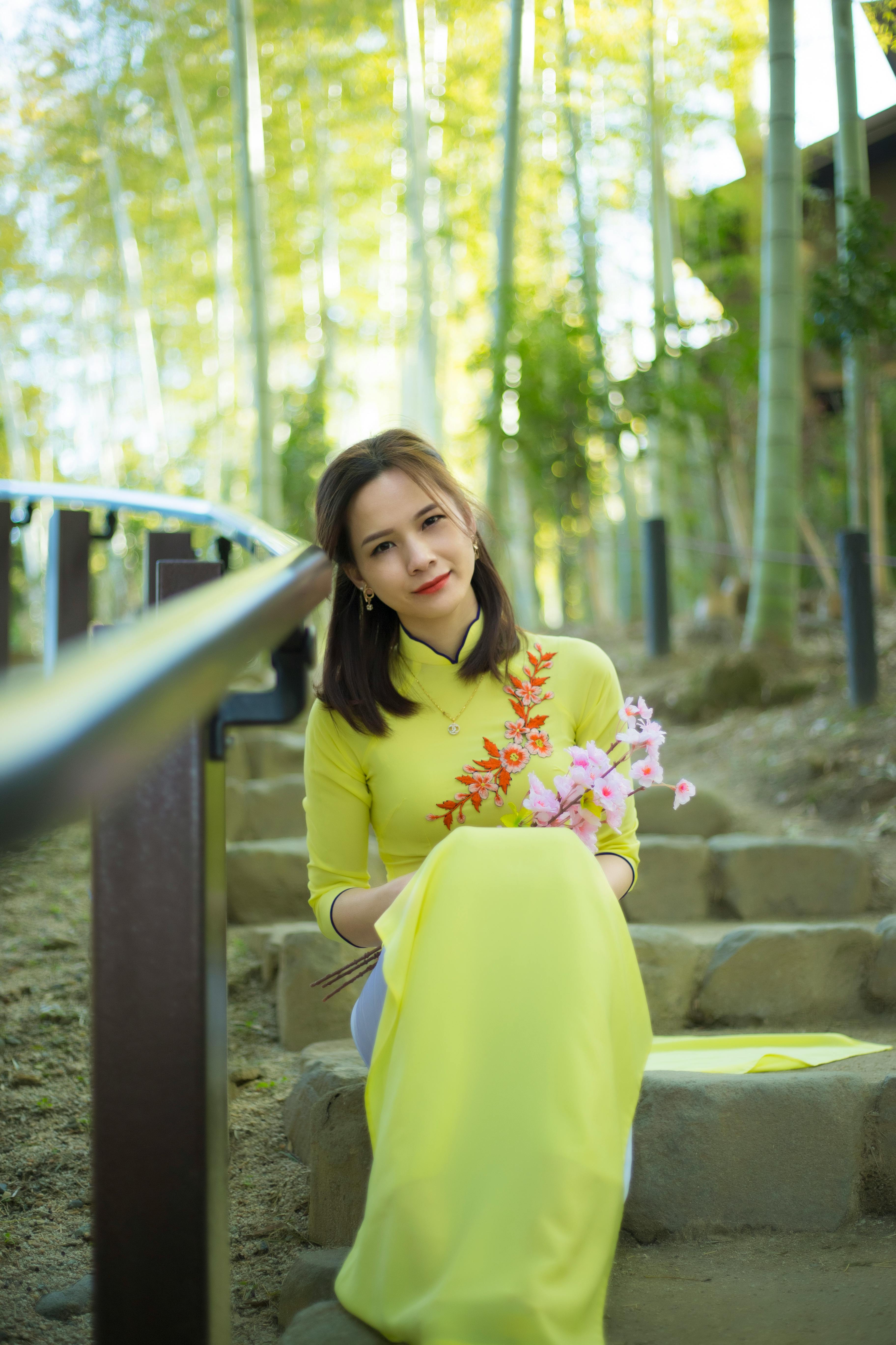 Women in Dress Sitting on Grass · Free Stock Photo