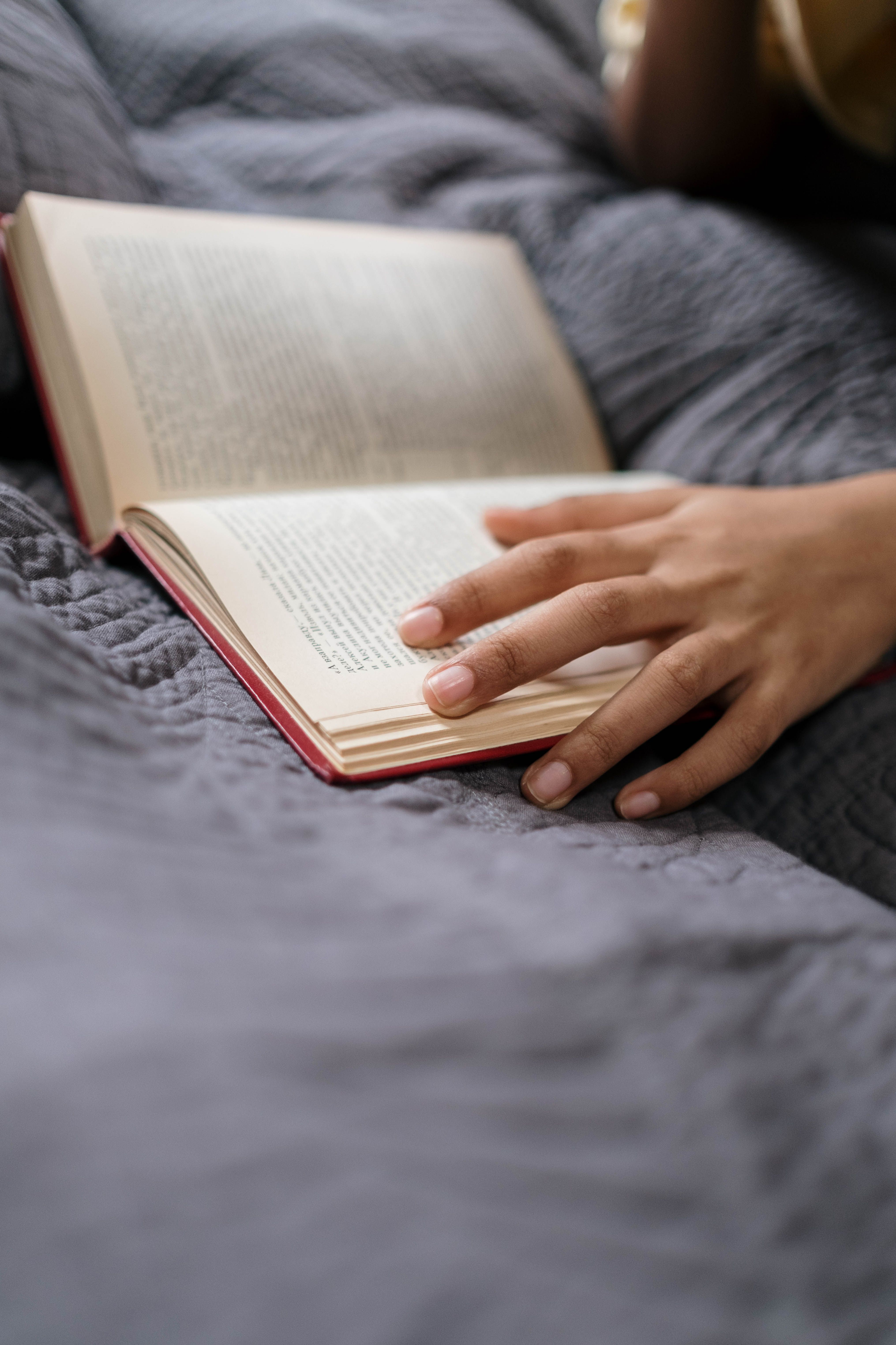 Book hled by a Person · Free Stock Photo