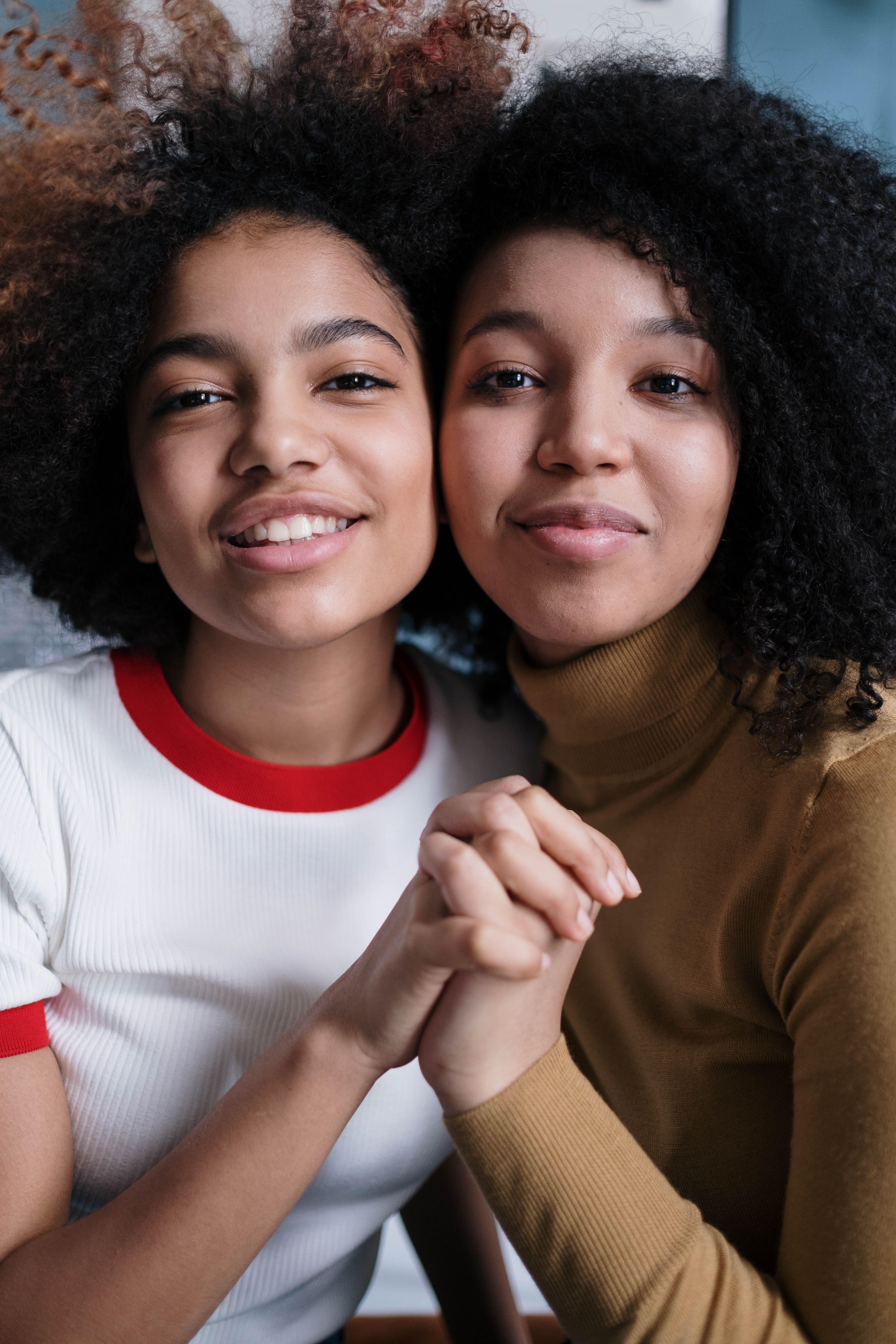 Friends Posing with Their Faces Together · Free Stock Photo