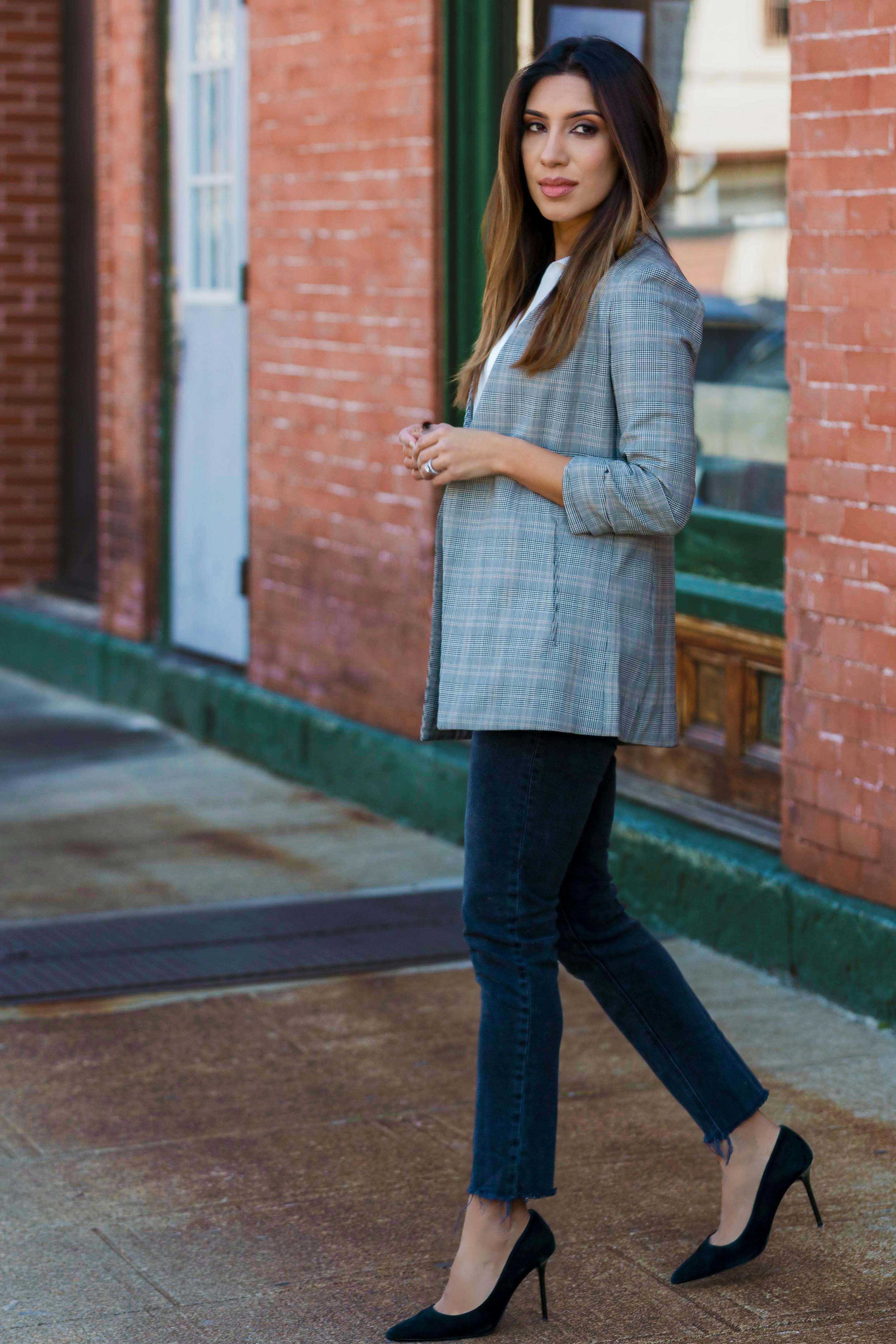 Model in High Heels Squatting · Free Stock Photo