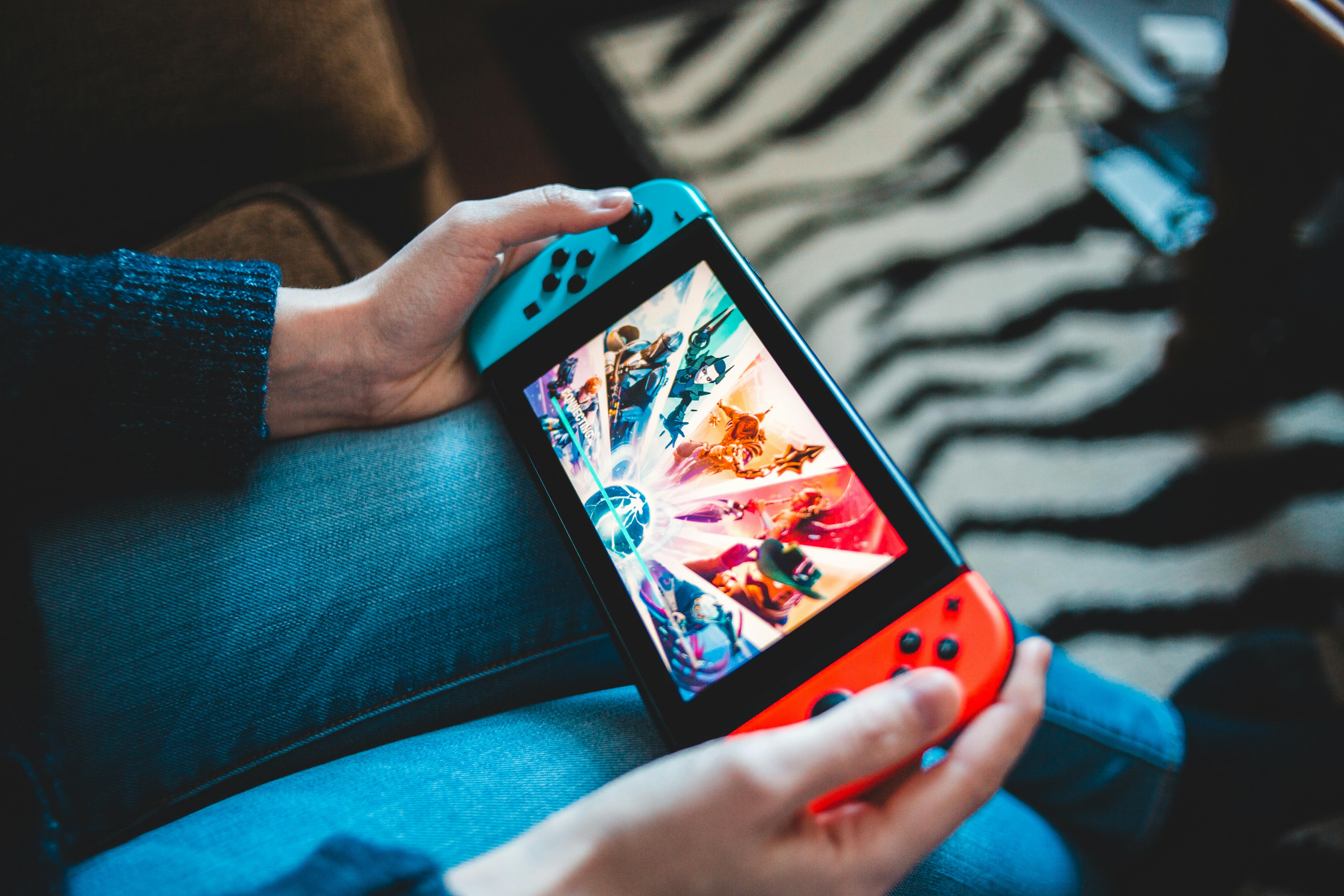A Person Playing a Game on a Nintendo Switch · Free Stock Photo