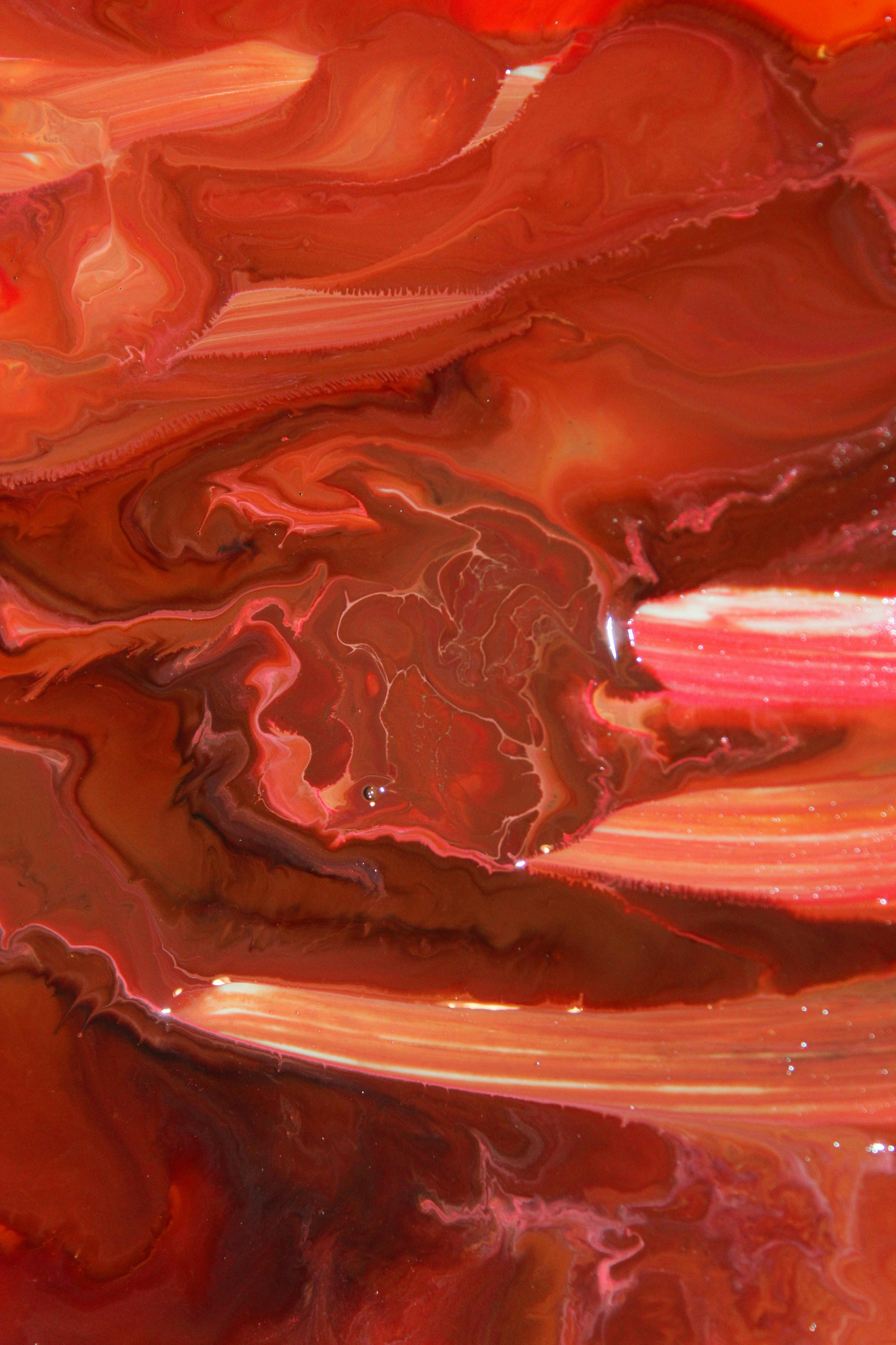 Red and White Mixed Paint in Close-Up Photography · Free Stock Photo