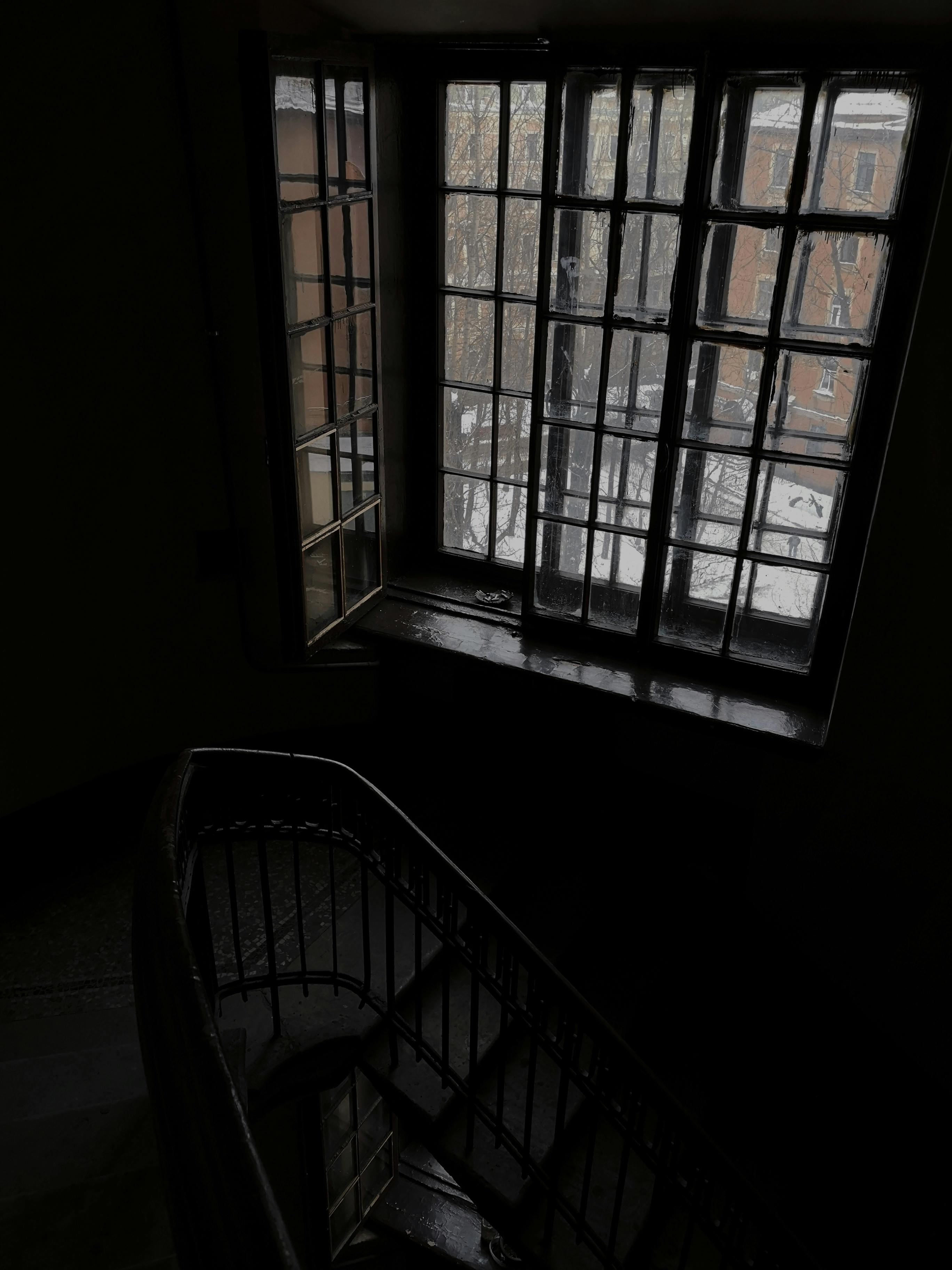 Staircase with large window in residential building · Free Stock Photo