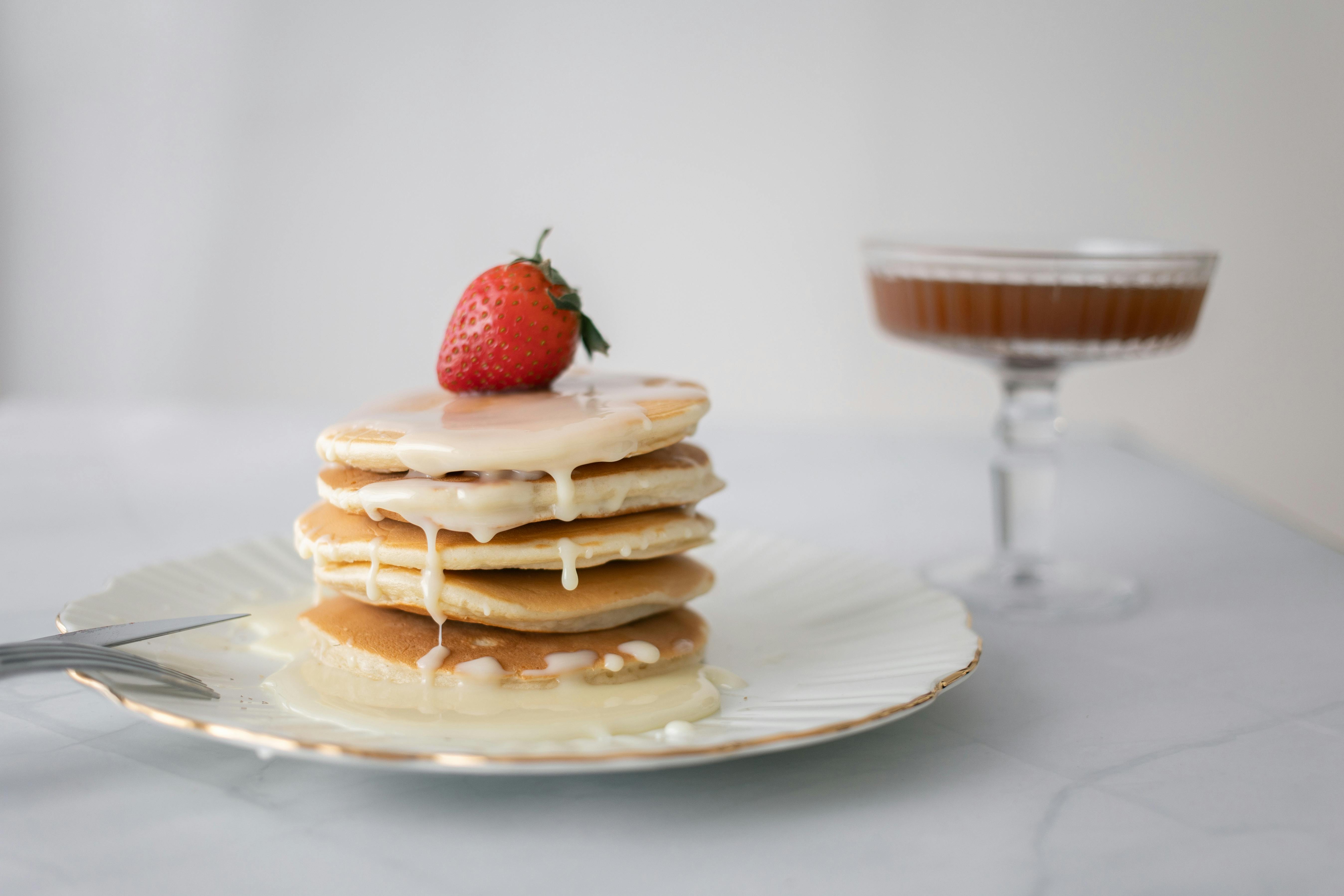 A Strawberry on a Pancake Stack · Free Stock Photo