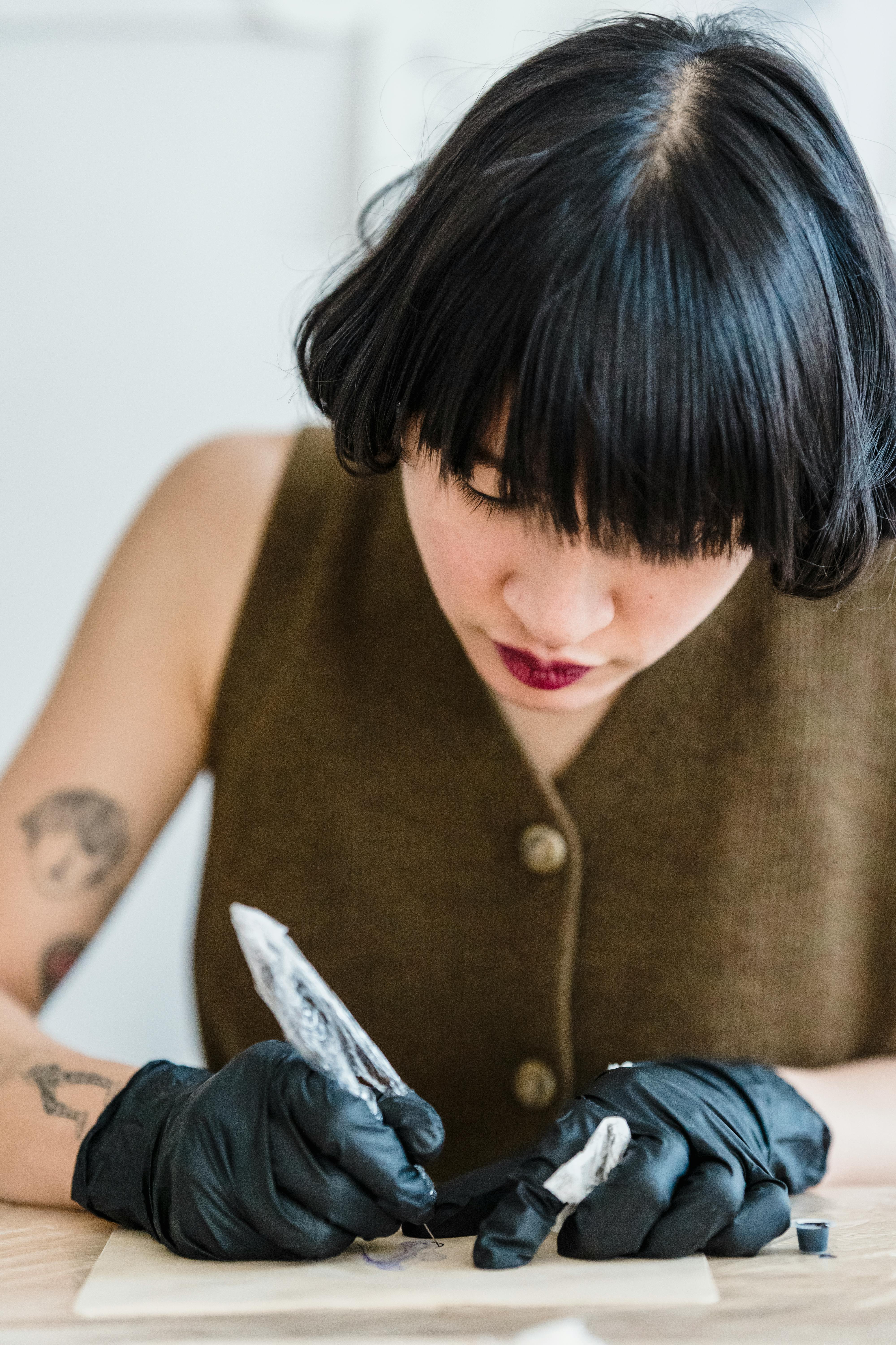 Woman Drawing with Ink · Free Stock Photo