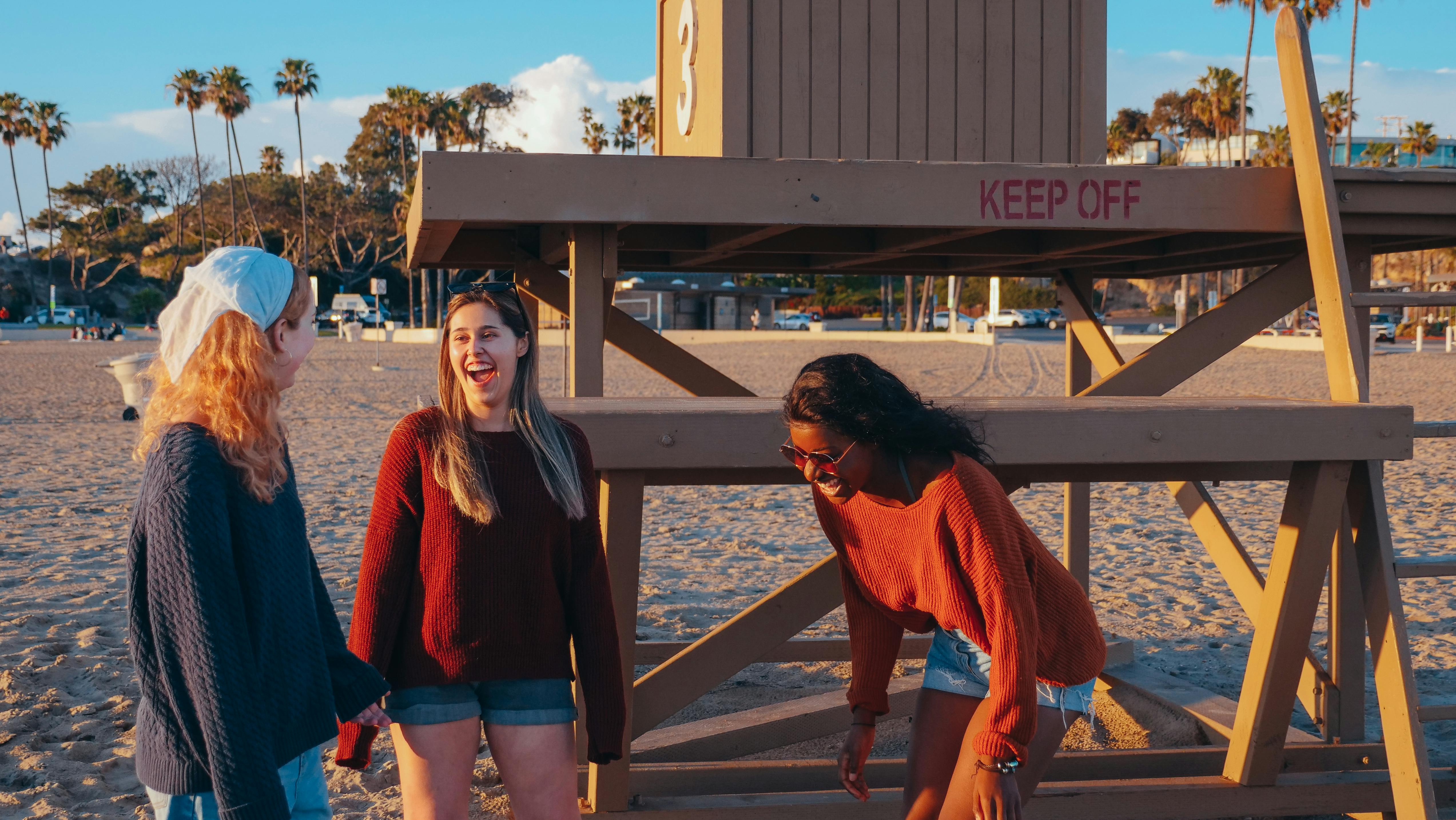 Three Men Standing While Laughing · Free Stock Photo