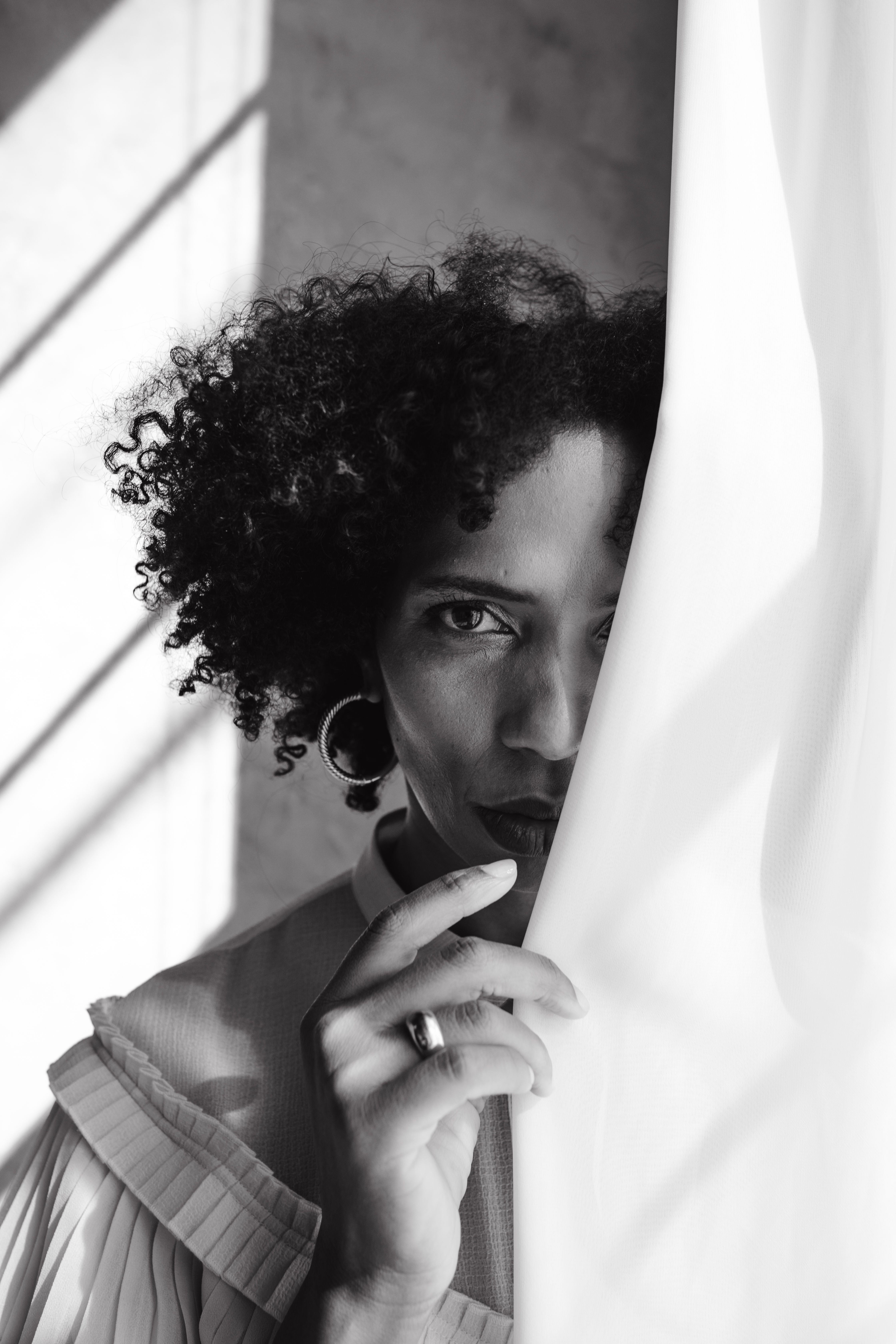 A Woman with her Hand on her Cheek · Free Stock Photo