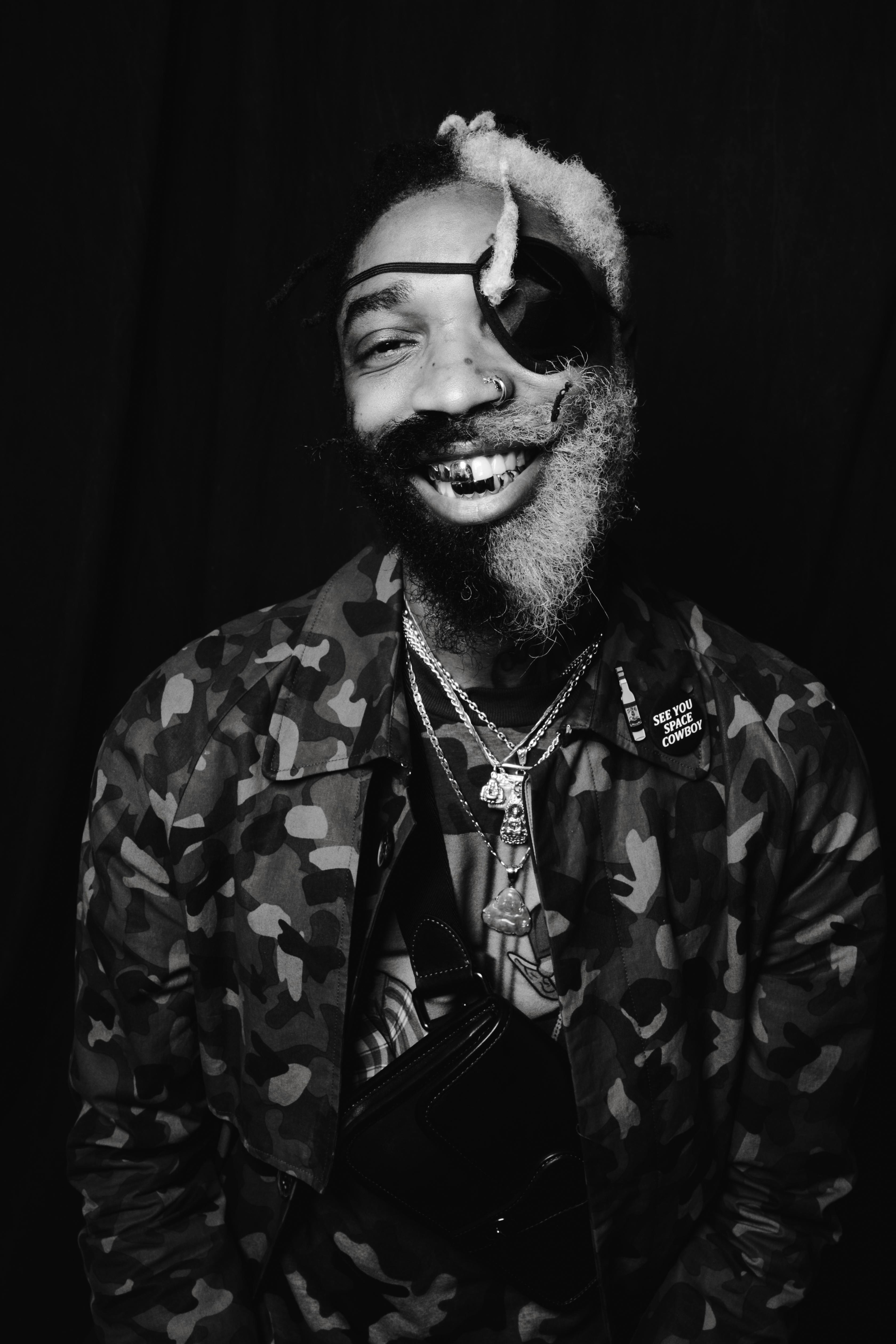 Grayscale Photo of Man Wearing Eye Patch · Free Stock Photo