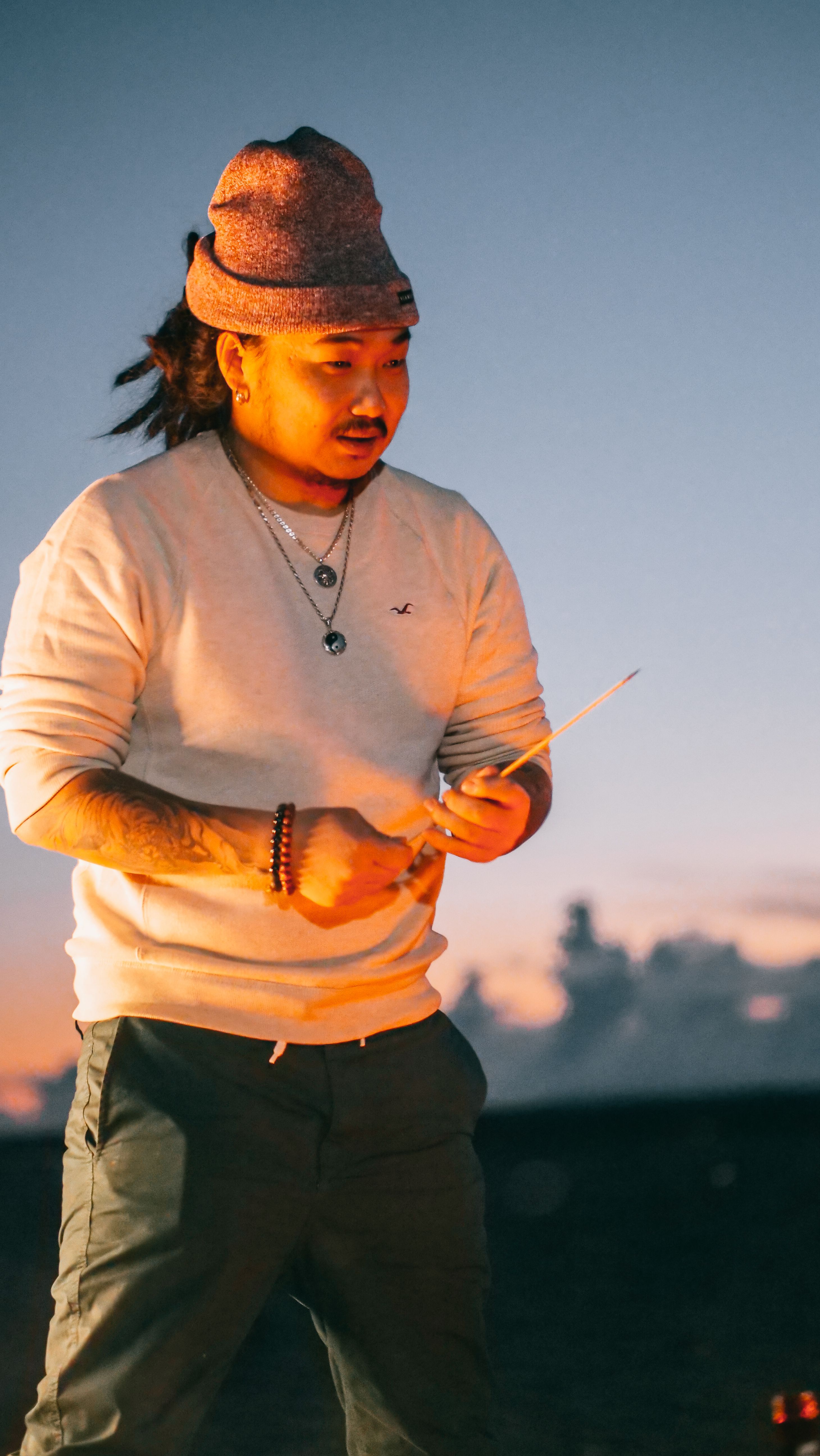Man Holding a Stick · Free Stock Photo