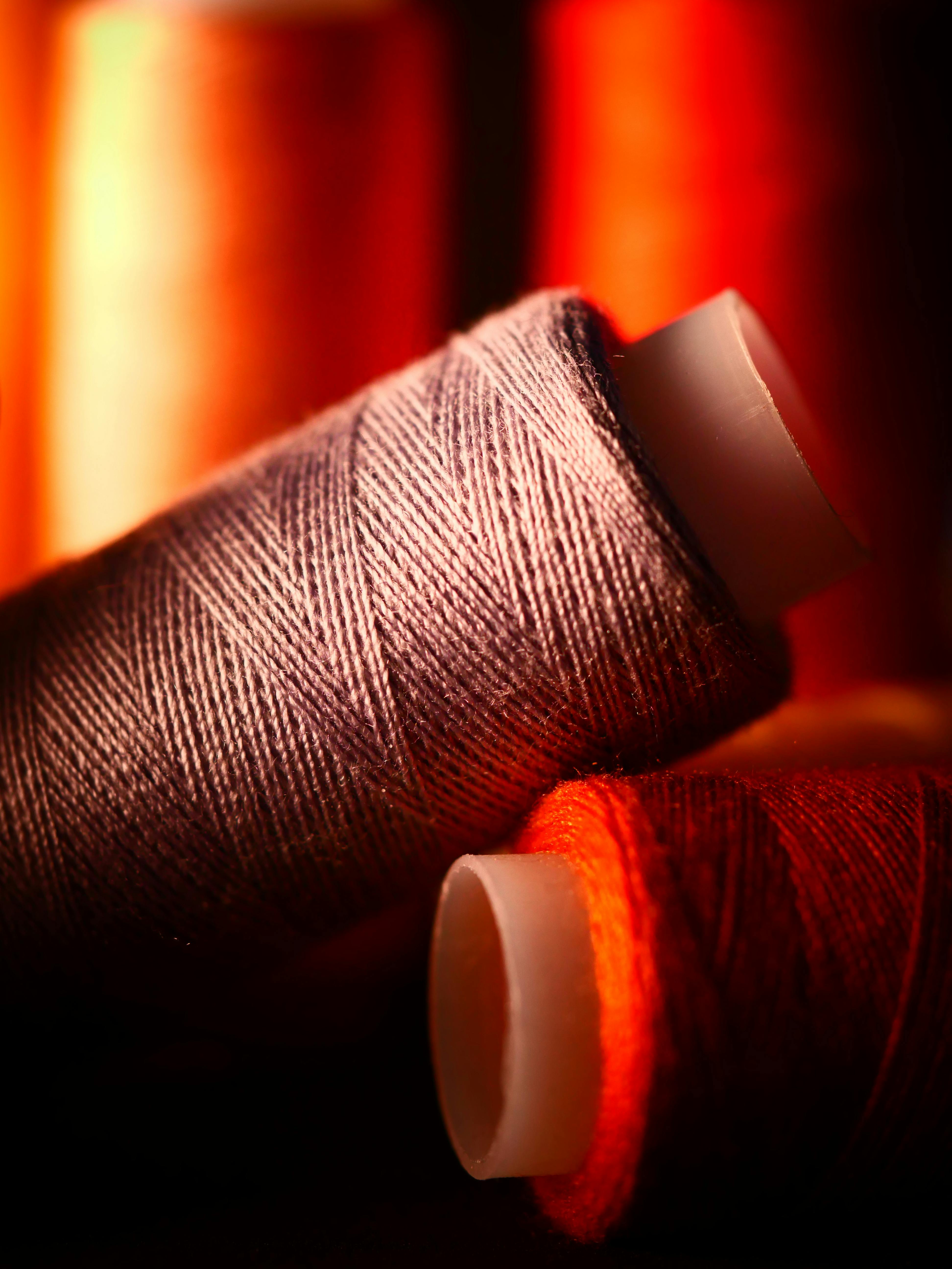 Close-up Photo of Colorful Threads · Free Stock Photo