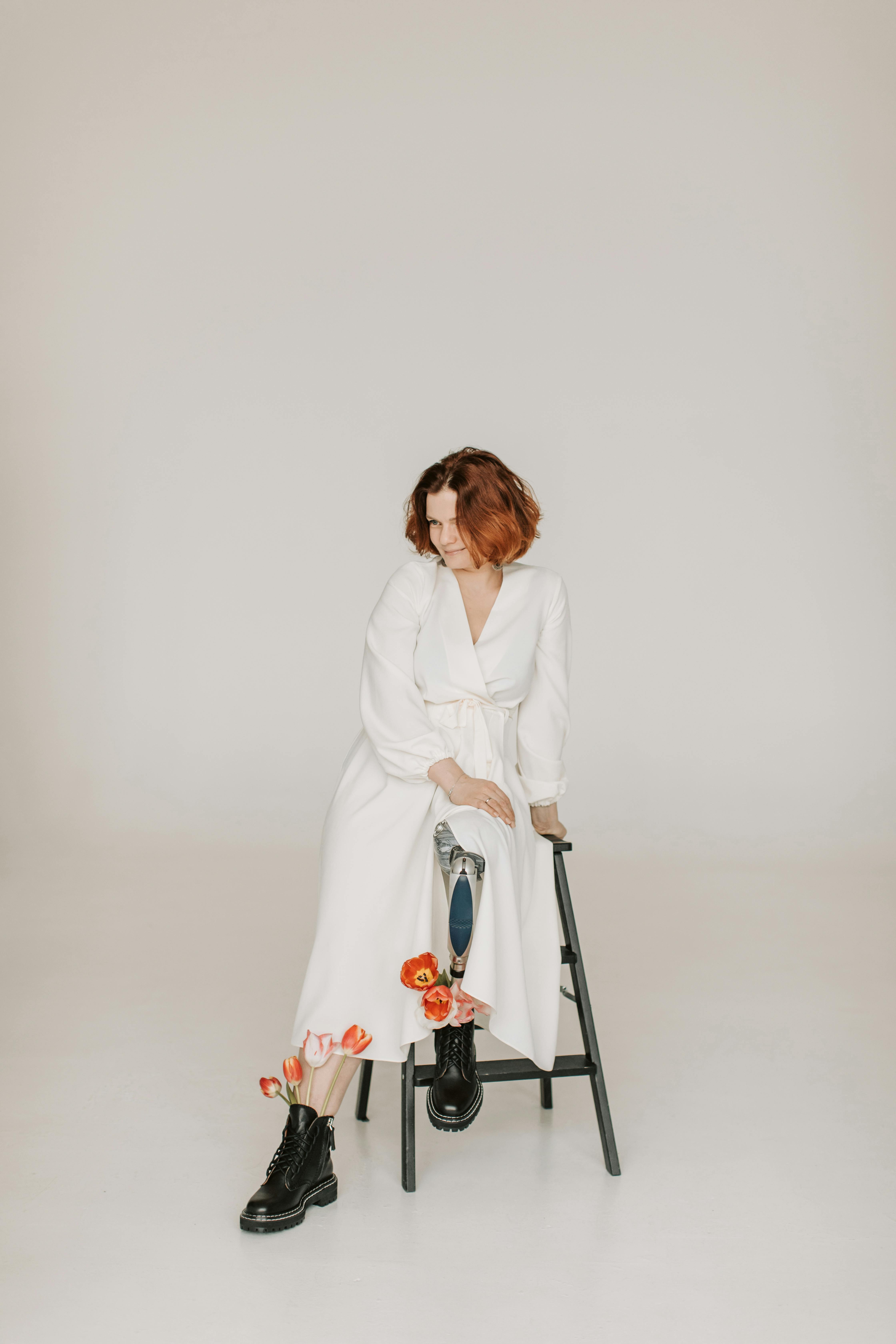 Woman in White Long Dress Sitting · Free Stock Photo