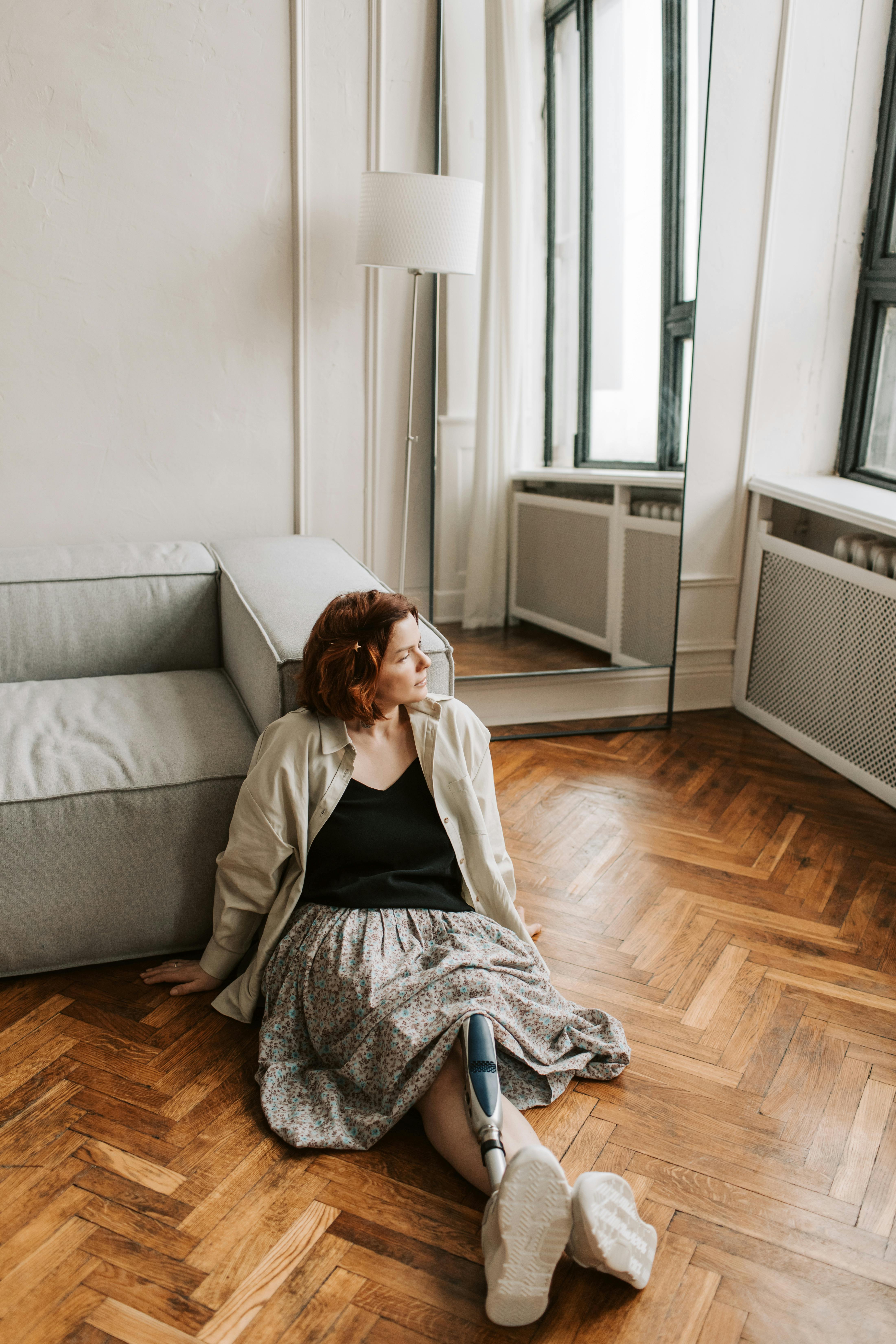Woman leaning on a Sofa · Free Stock Photo