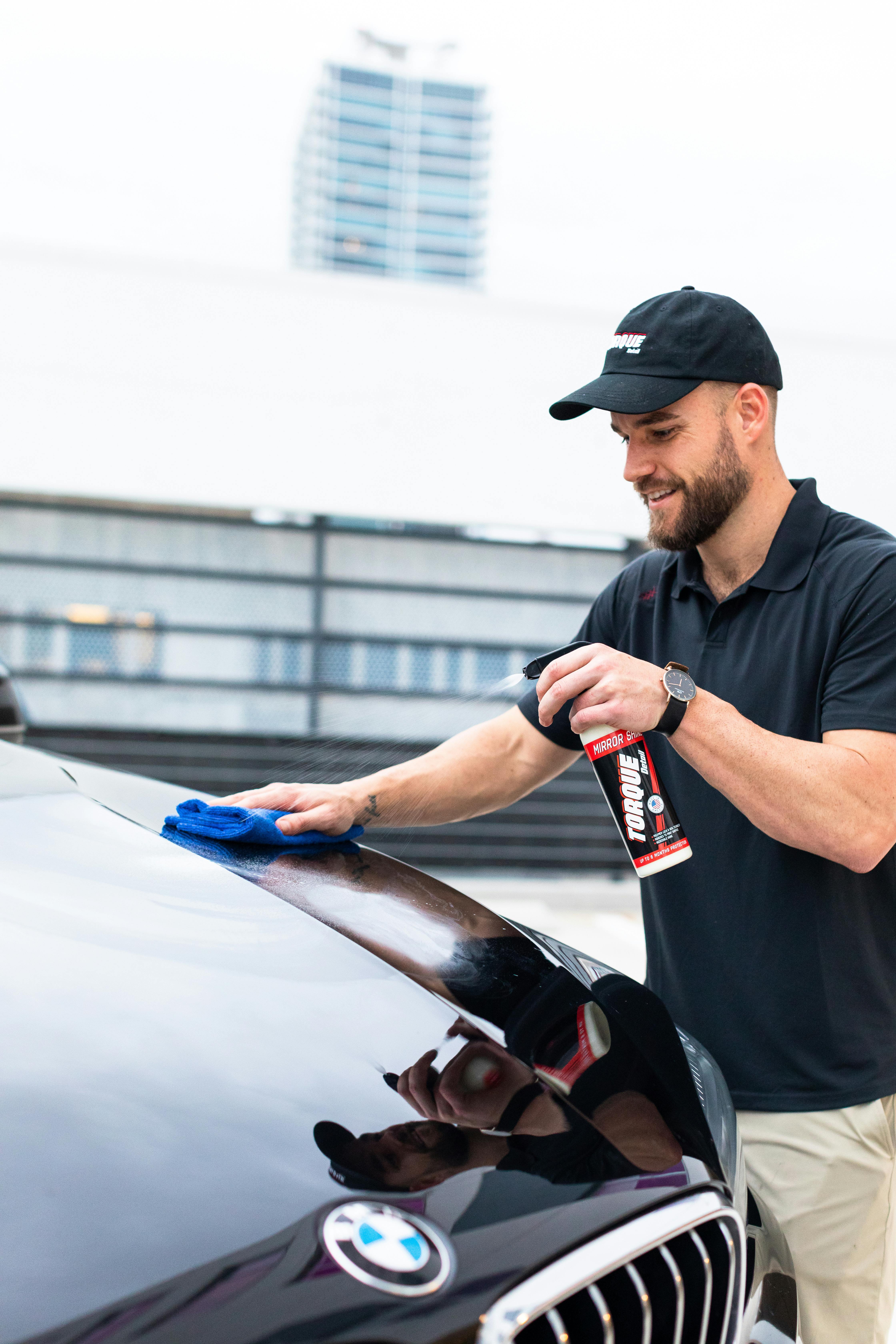 Man Cleaning his Car · Free Stock Photo