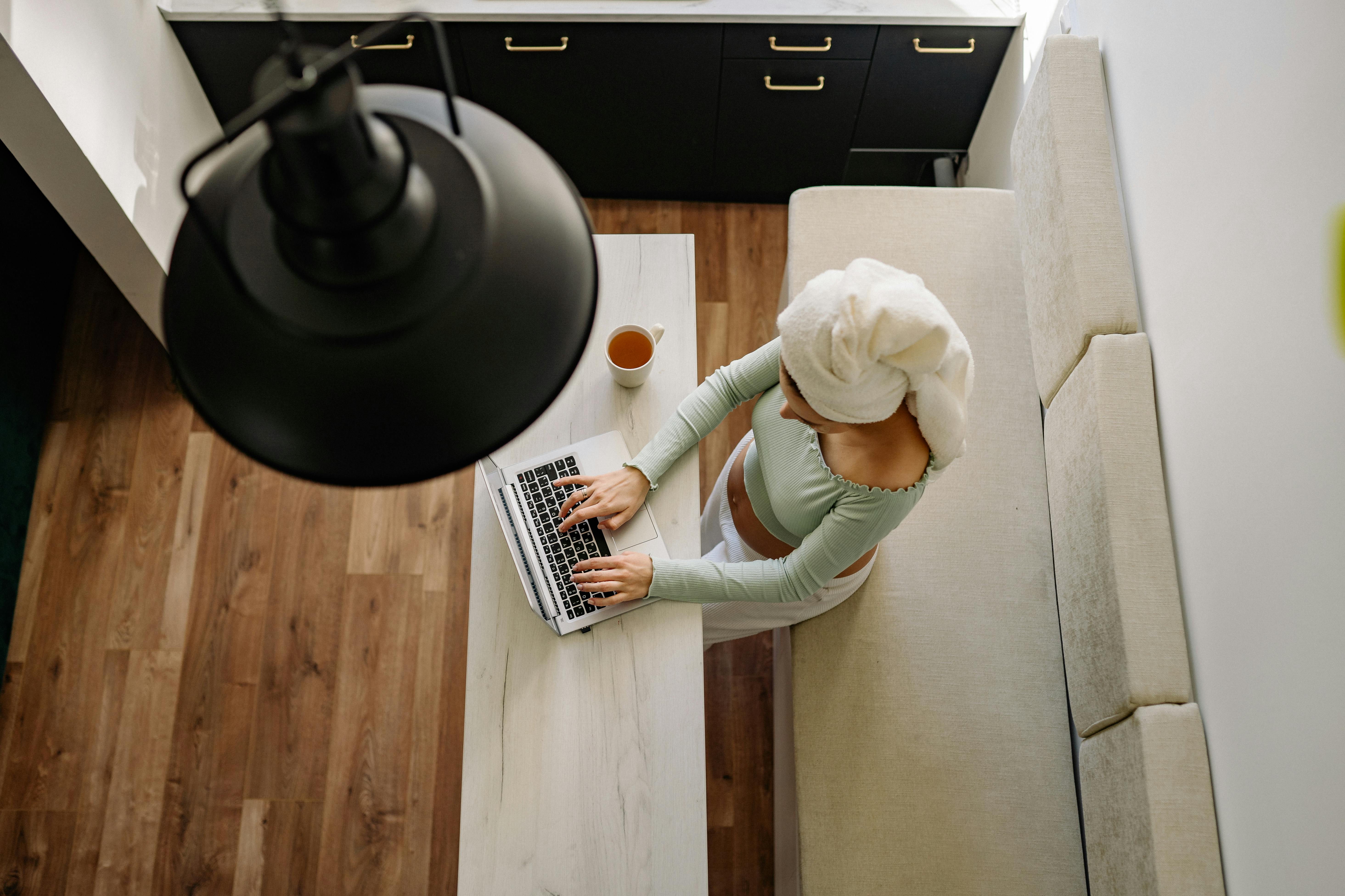 Pregnant Woman using Laptop · Free Stock Photo