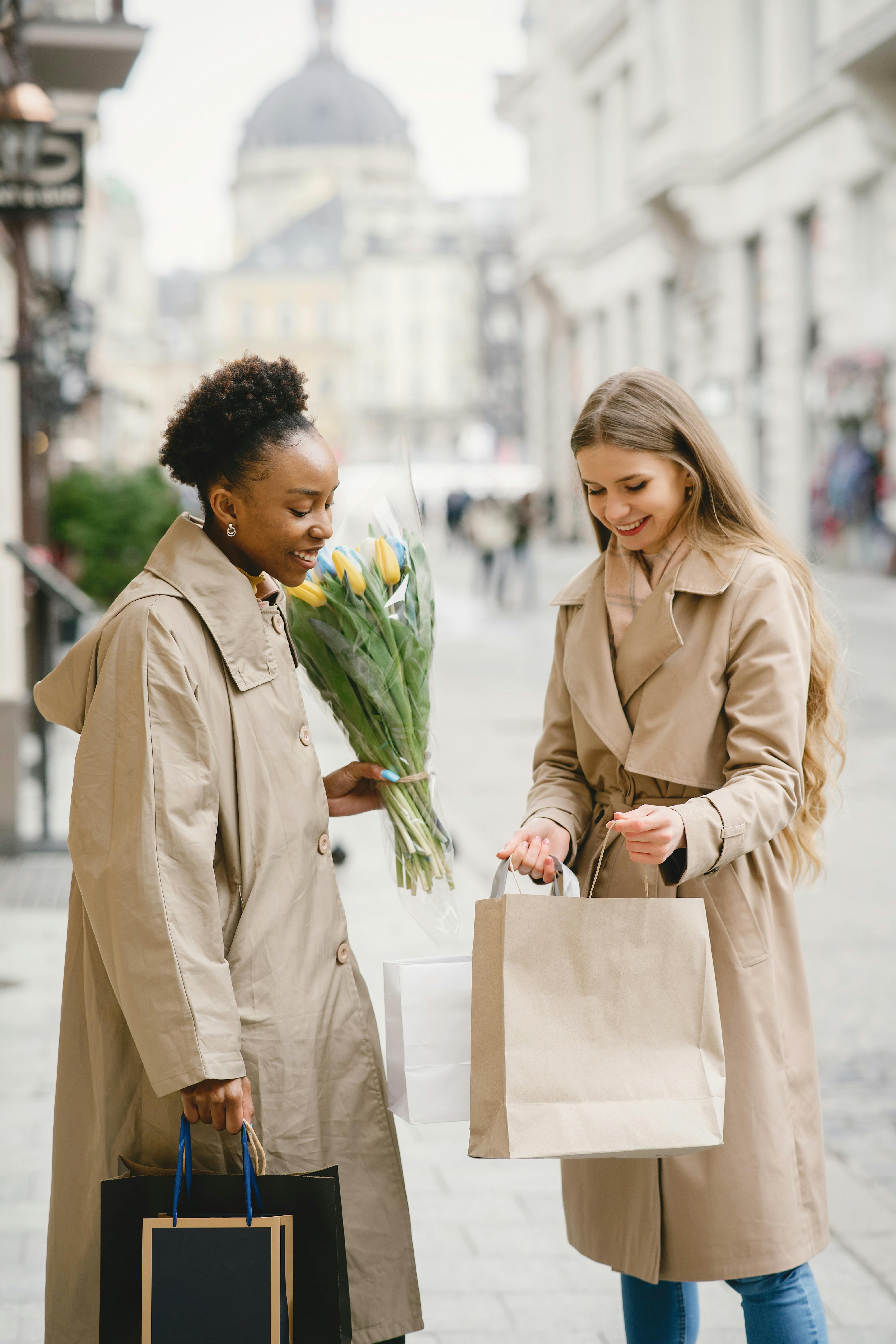 Women looking inside a Paperbag · Free Stock Photo