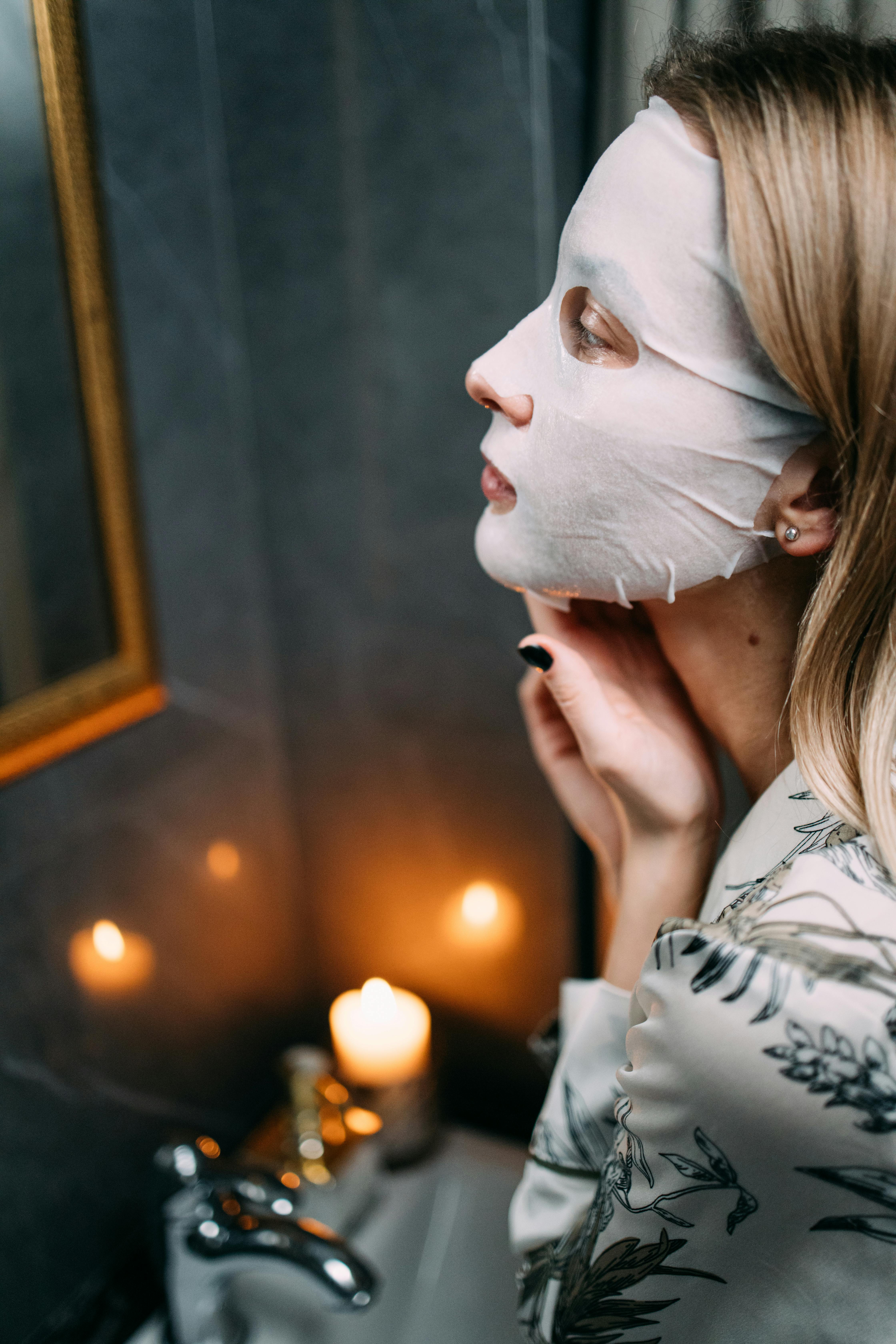 A Woman Applying Clay Mask · Free Stock Photo