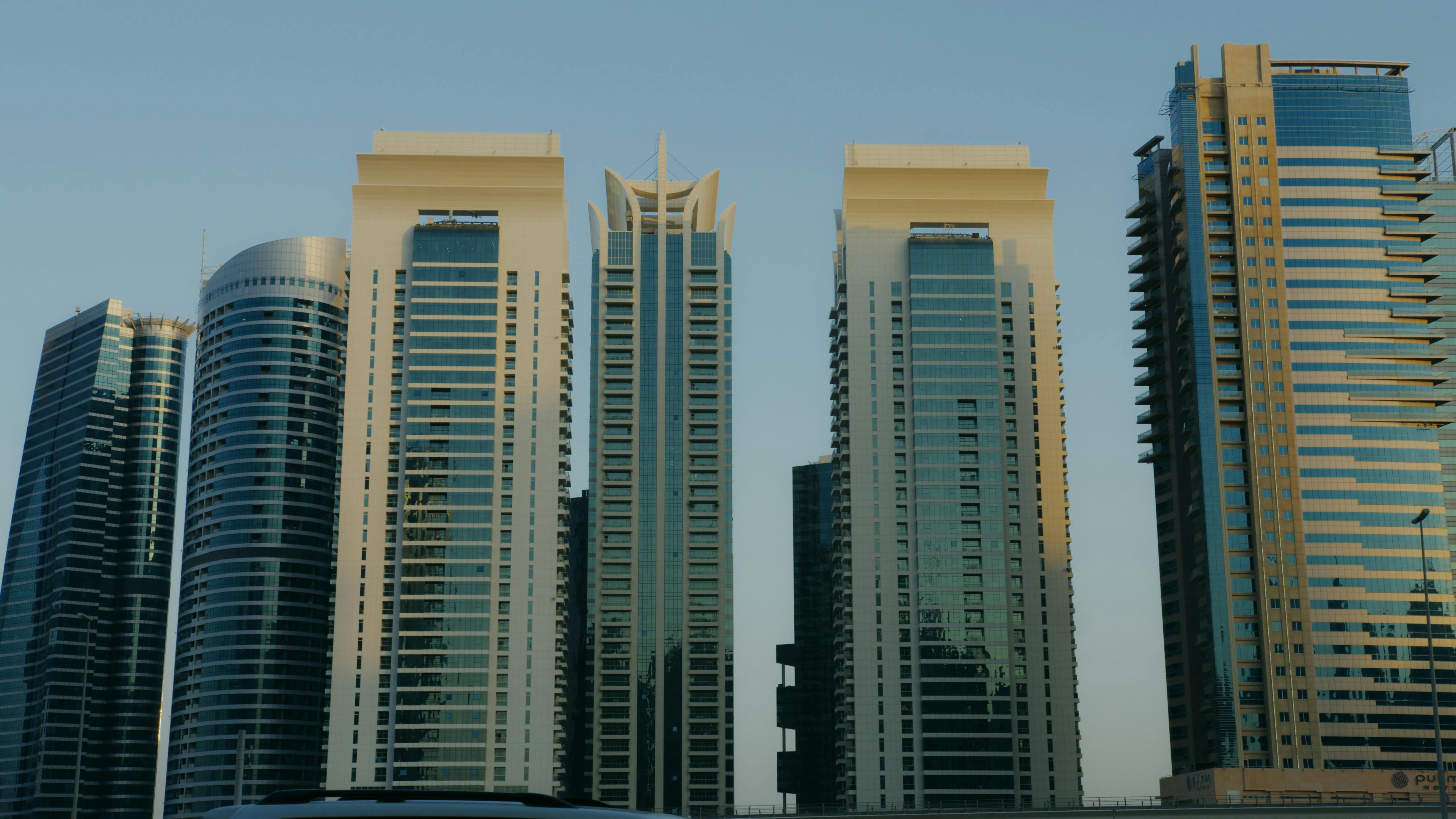 City Skyline of High Rise Buildings Under Blue Sky · Free Stock Photo