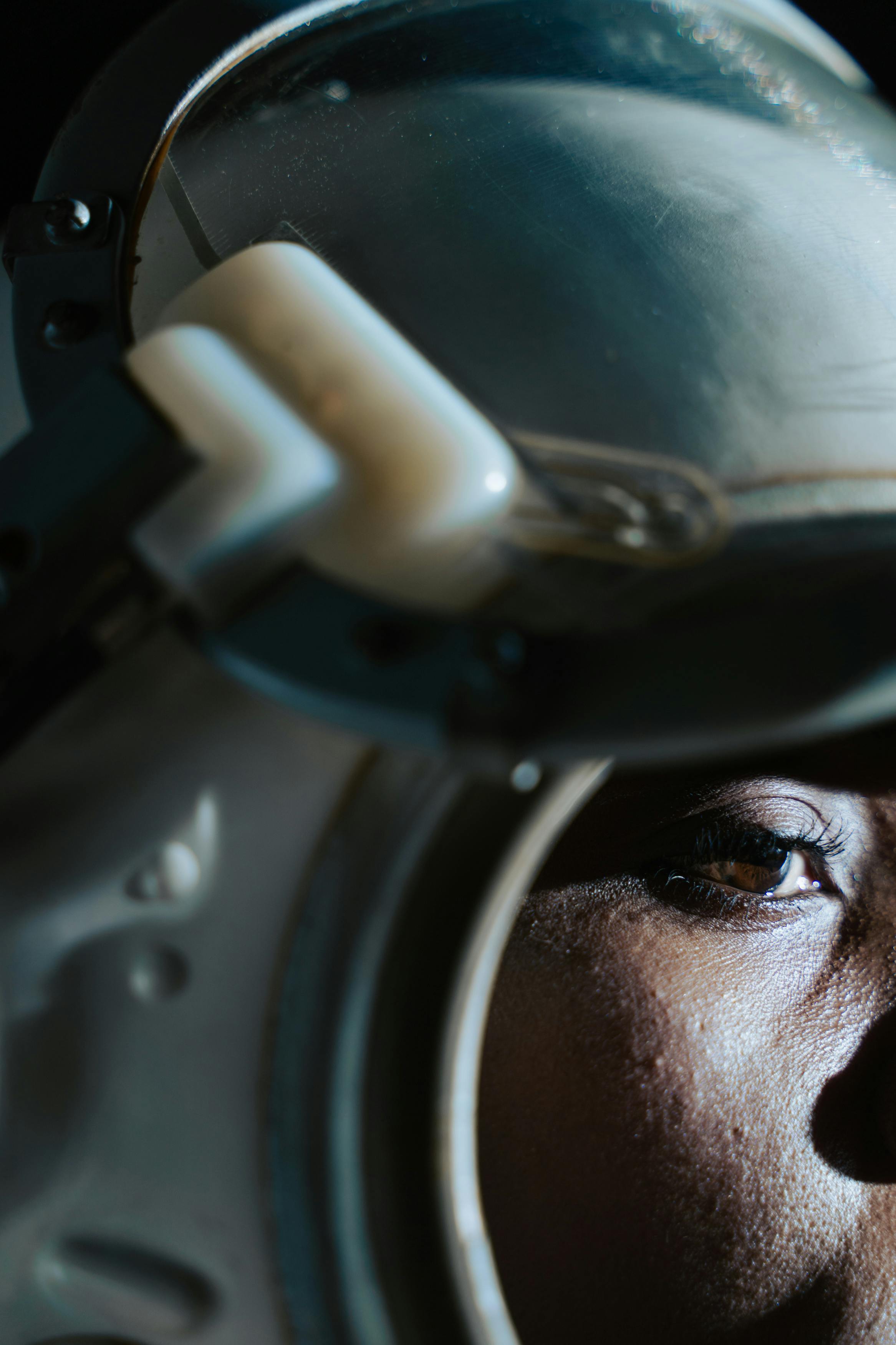 Close-Up Photo of a Person Wearing Space Helmet · Free Stock Photo