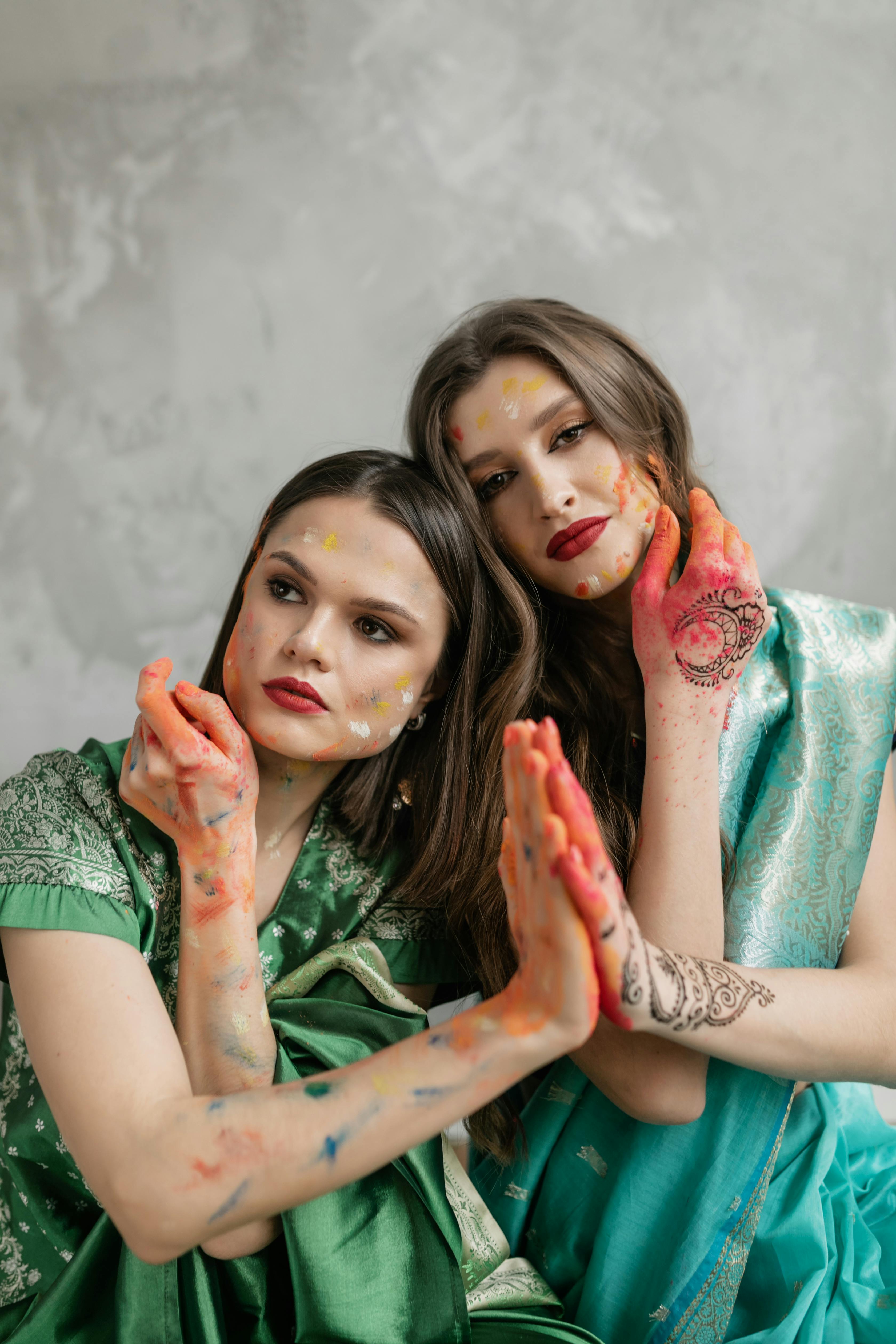 Two Women Wearing Traditional Clothes · Free Stock Photo