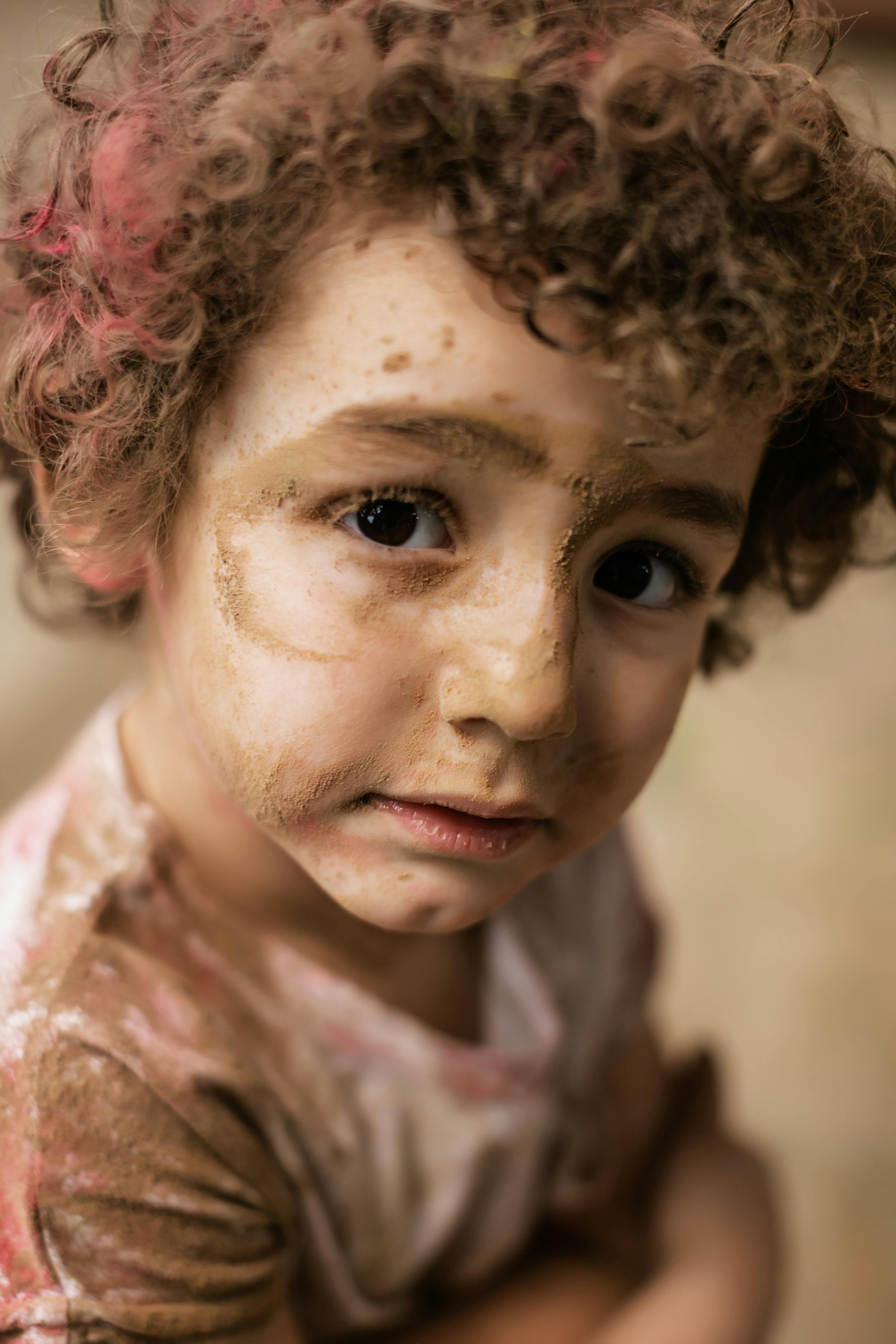 Photo of a Boy Throwing Holi Powder · Free Stock Photo