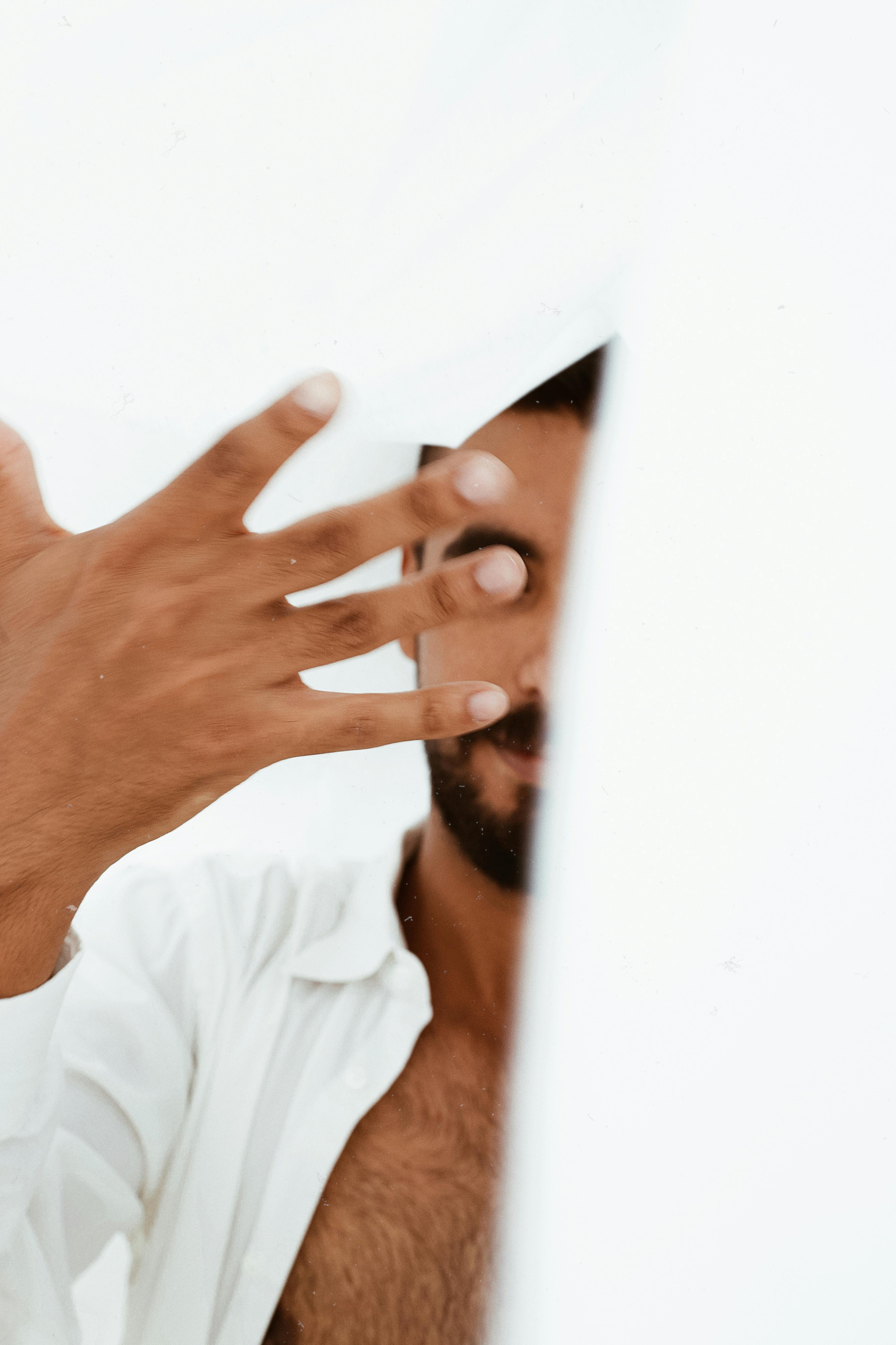 Hand of a Man Reaching towards the Camera · Free Stock Photo