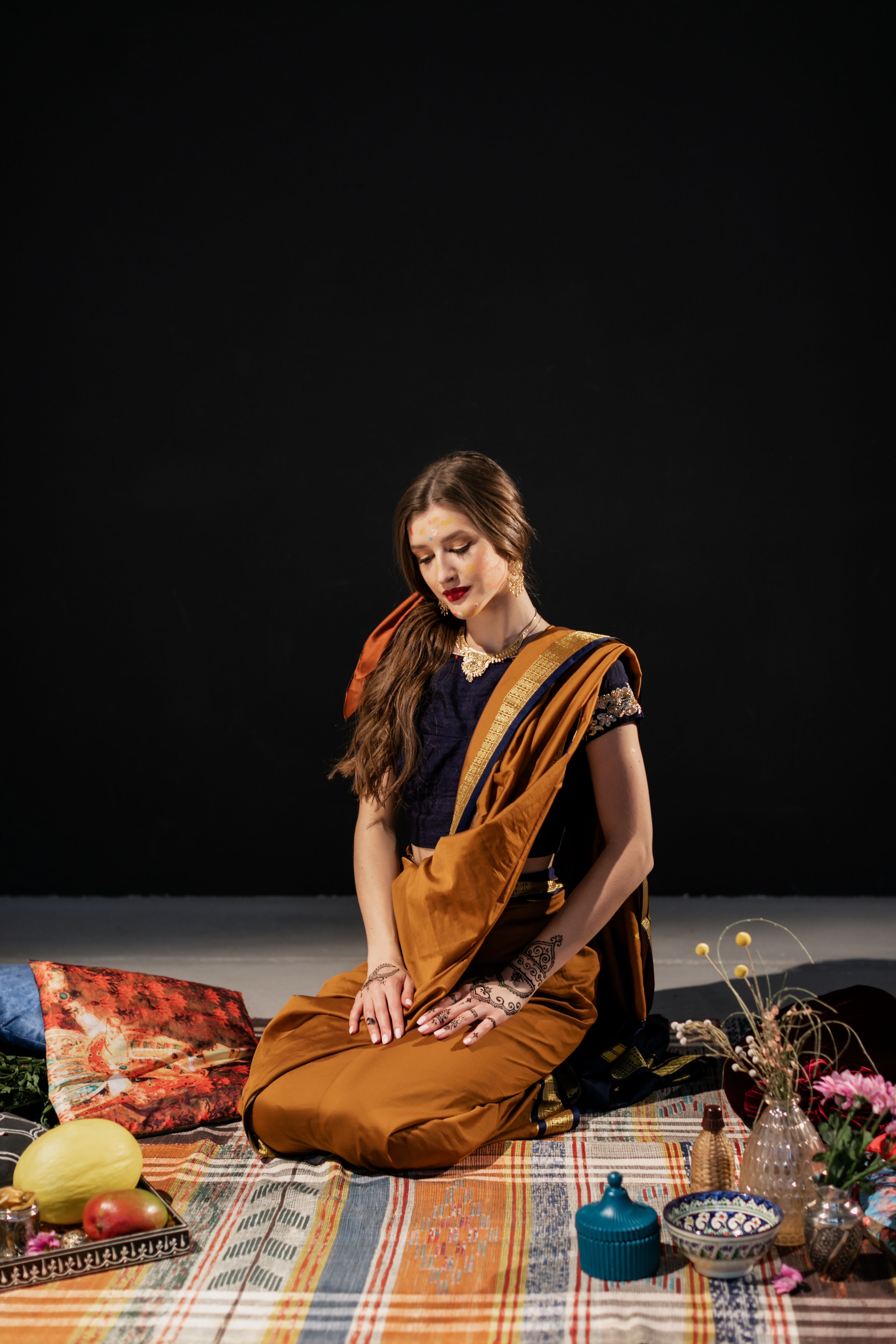Unwrapped Sari Flying behind Woman Standing on Bridge · Free Stock Photo
