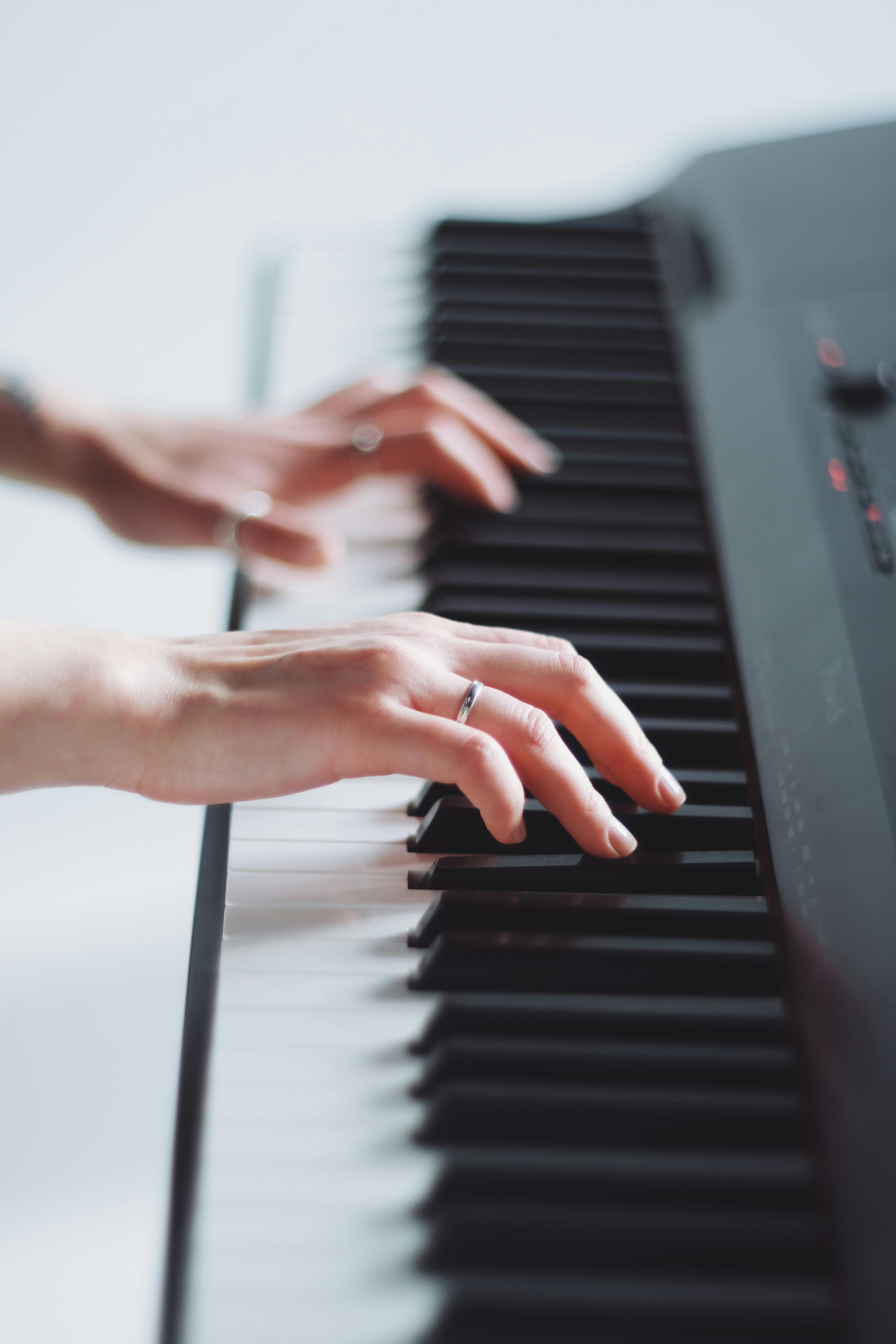 A Person Playing the Keyboard · Free Stock Photo