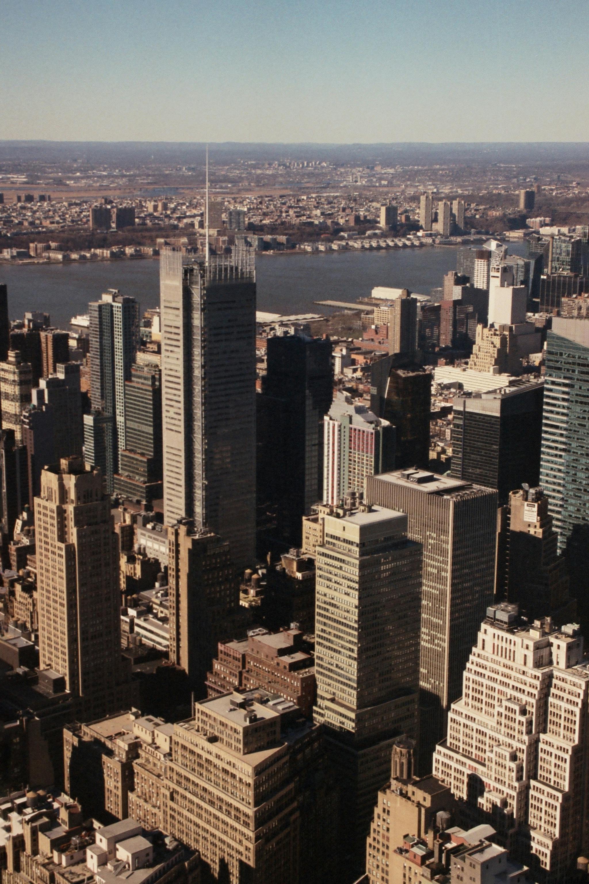 Aerial Photography of High Rise Buildings Under Blue Sky · Free Stock Photo