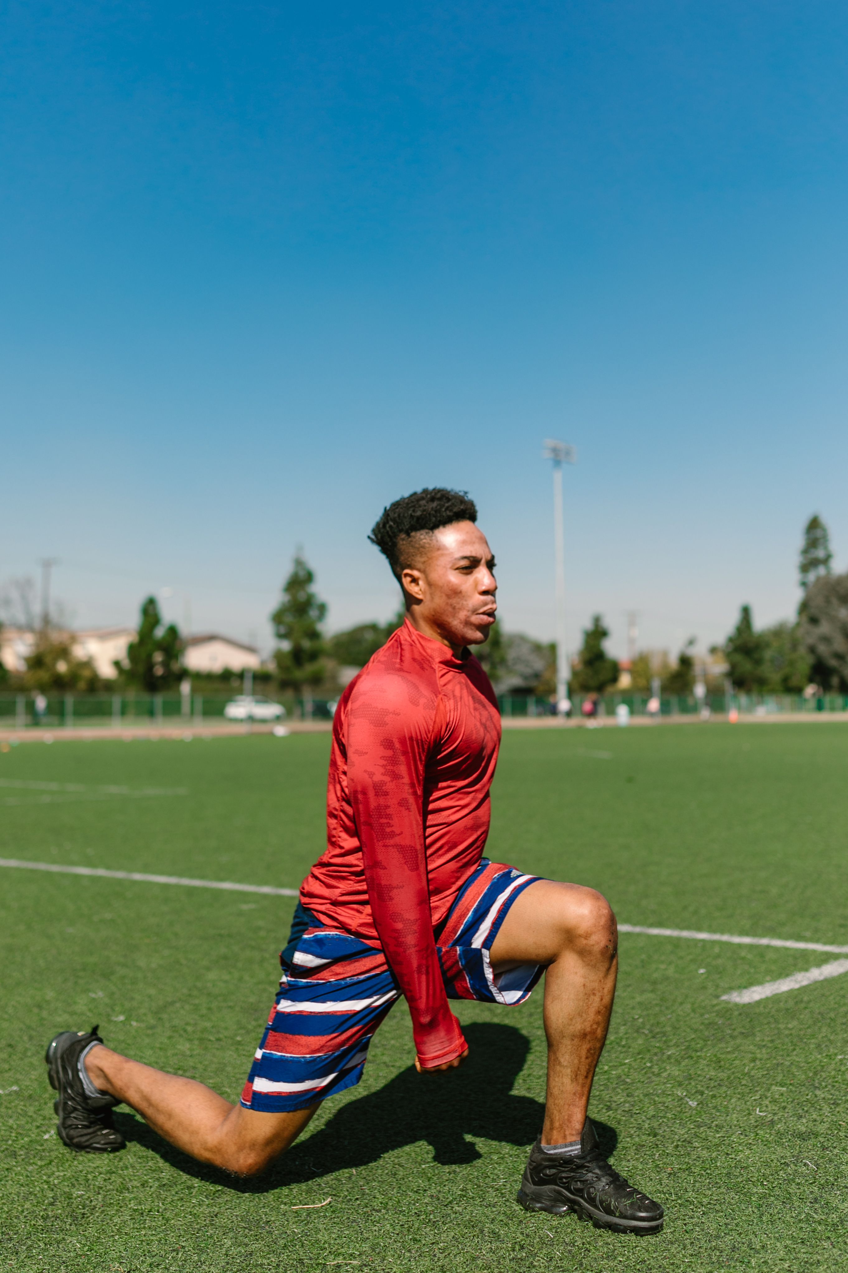 Athletes Stretching and Warming Up · Free Stock Photo