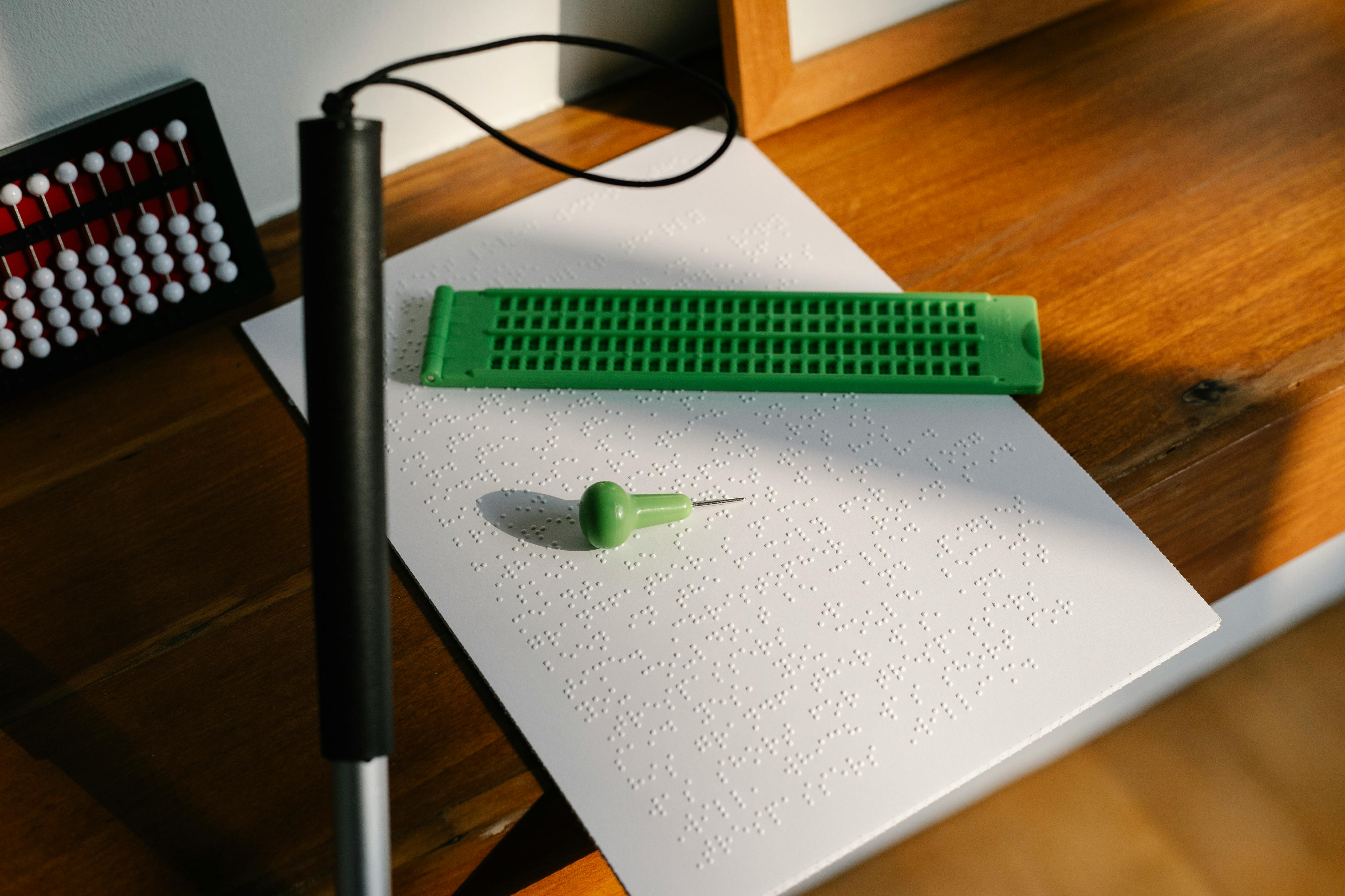 Photo of Visually Impaired Tools on Wooden Desk · Free Stock Photo