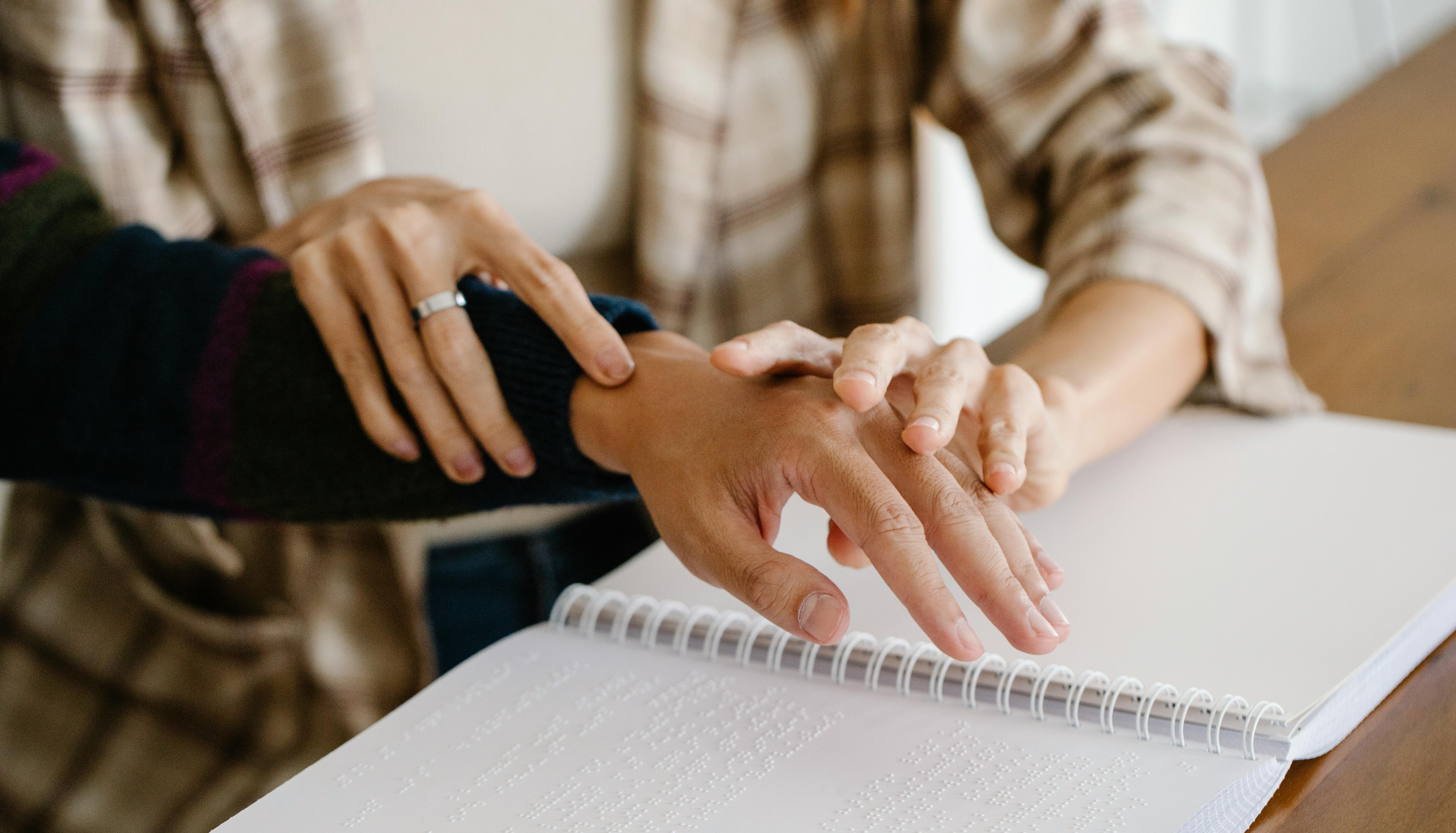 Close-Up Photo of Woman Assisting Man · Free Stock Photo