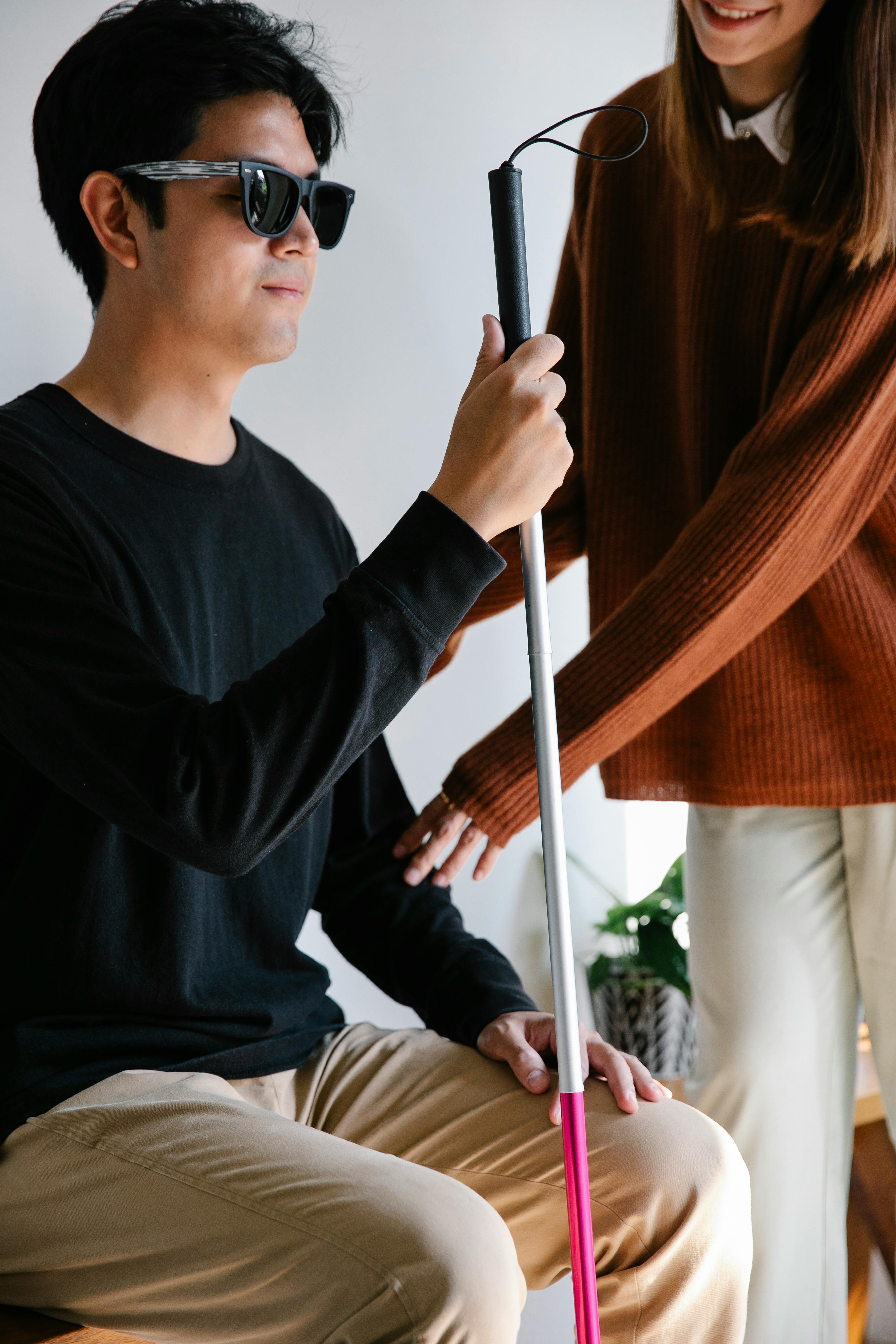 Photo of Woman Assisting Man · Free Stock Photo