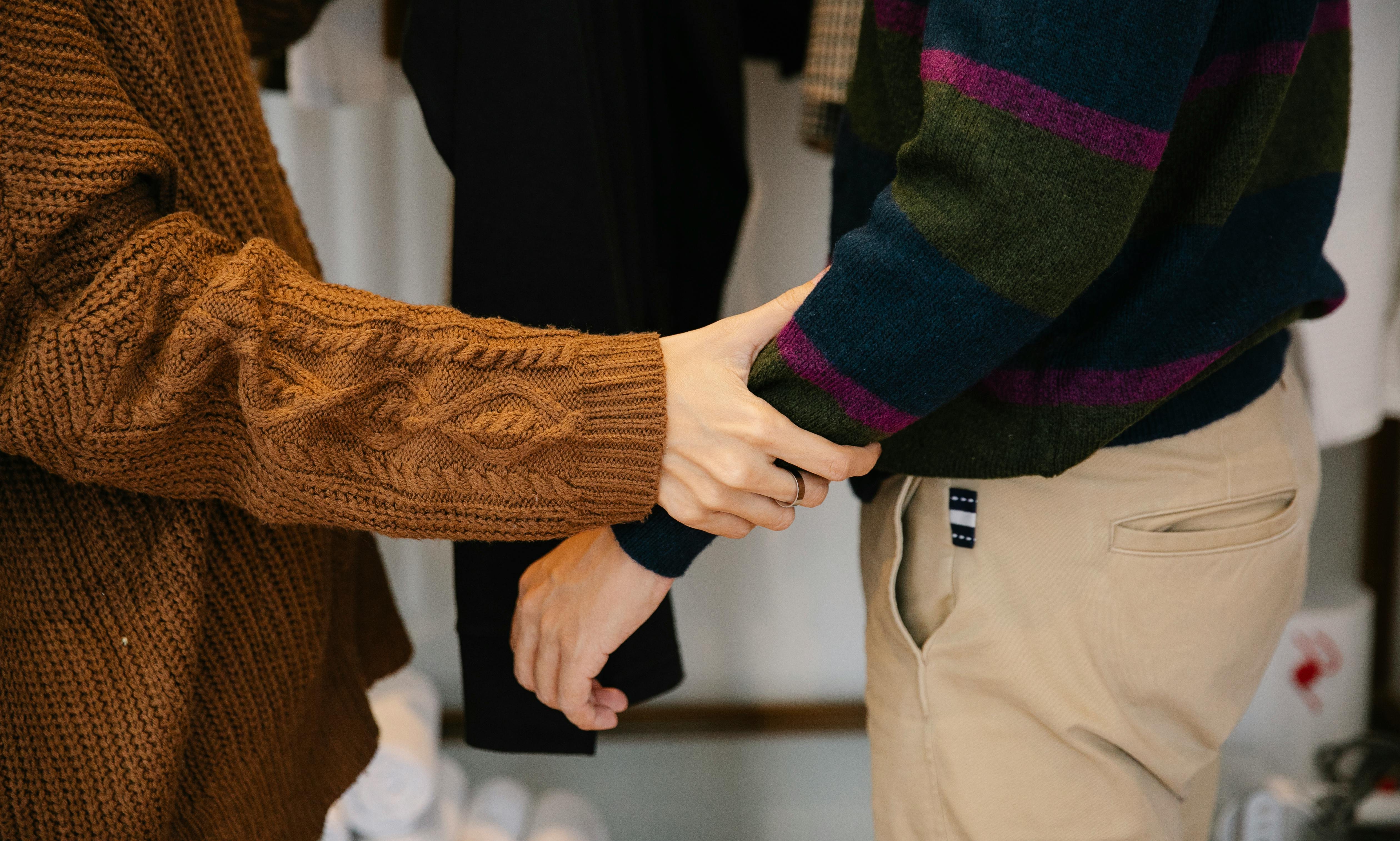 Photo of Person Holding Another Person's Arm · Free Stock Photo