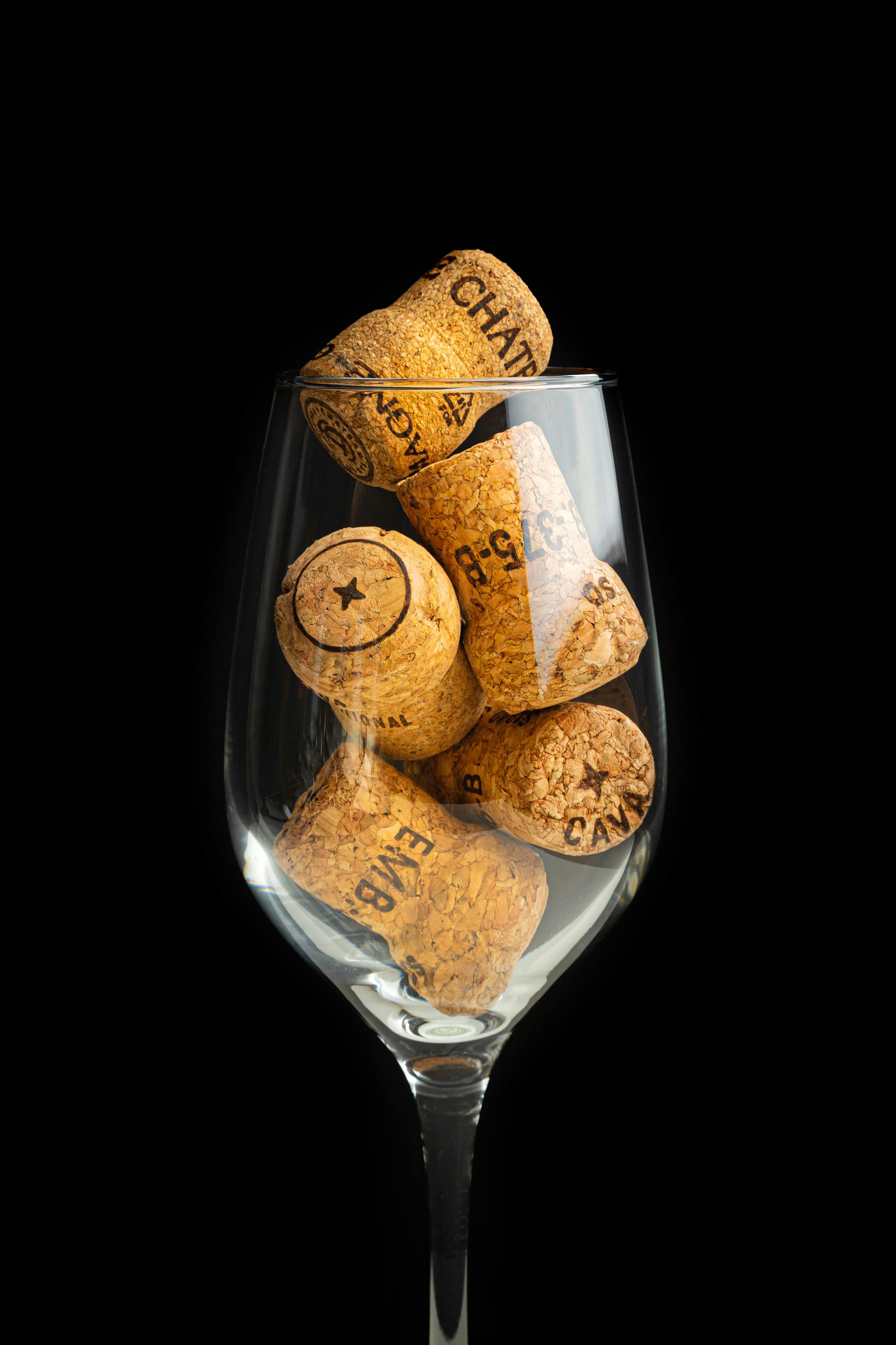 Champagne Corks in a Glass · Free Stock Photo