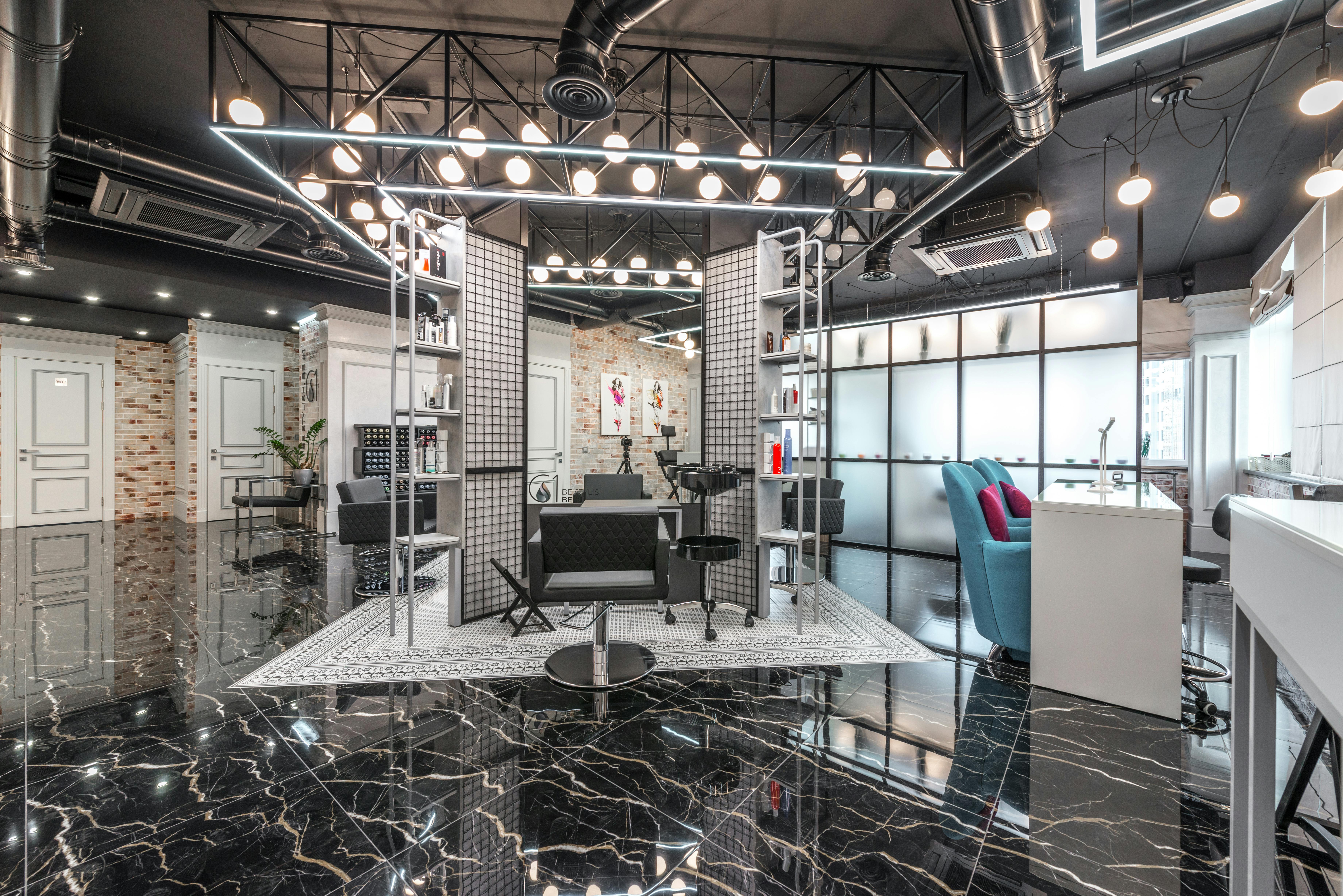 Modern hairdressing salon interior design with leather chairs · Free ...