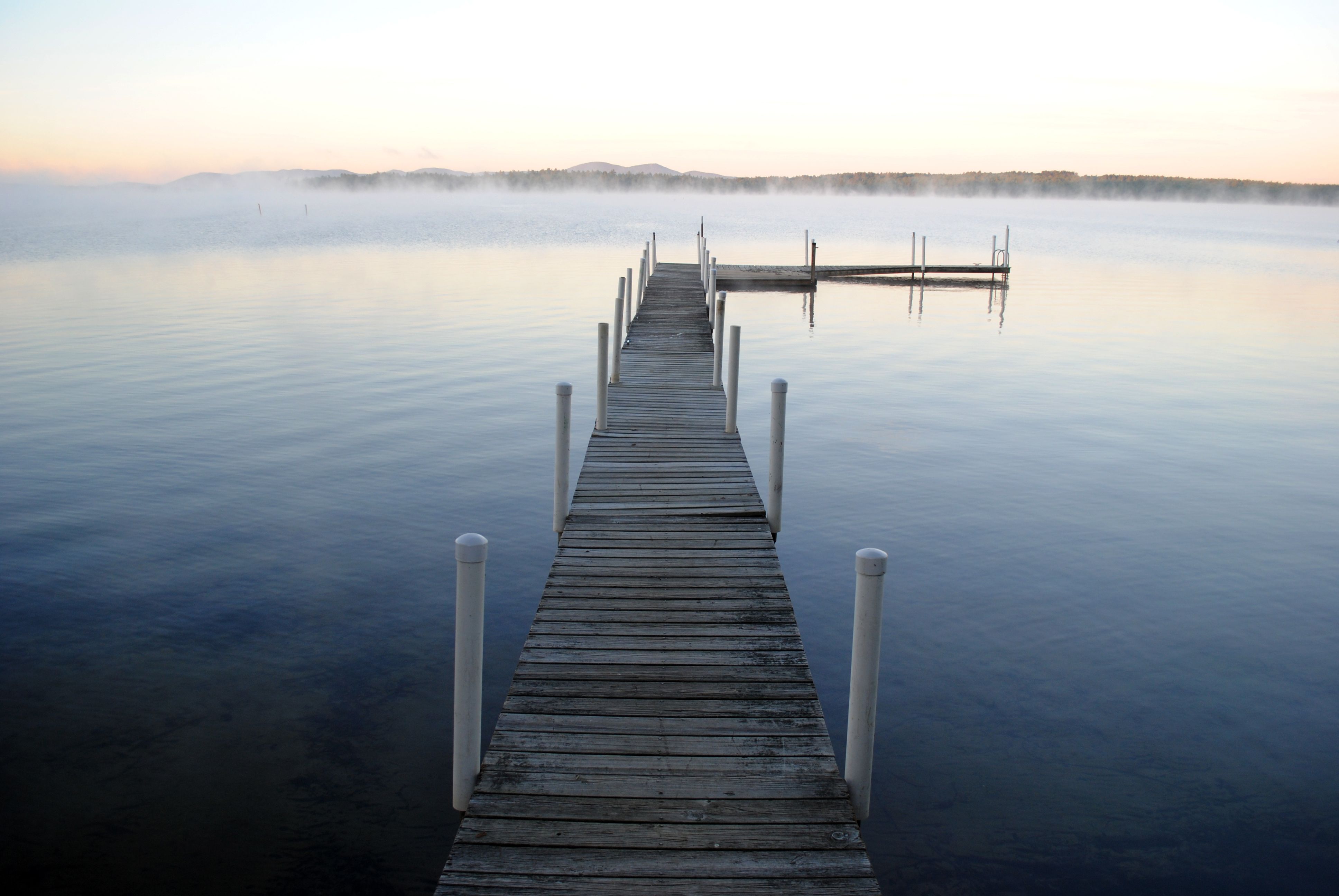 Photo of a Brown Wooden Dock on Calm Water · Free Stock Photo