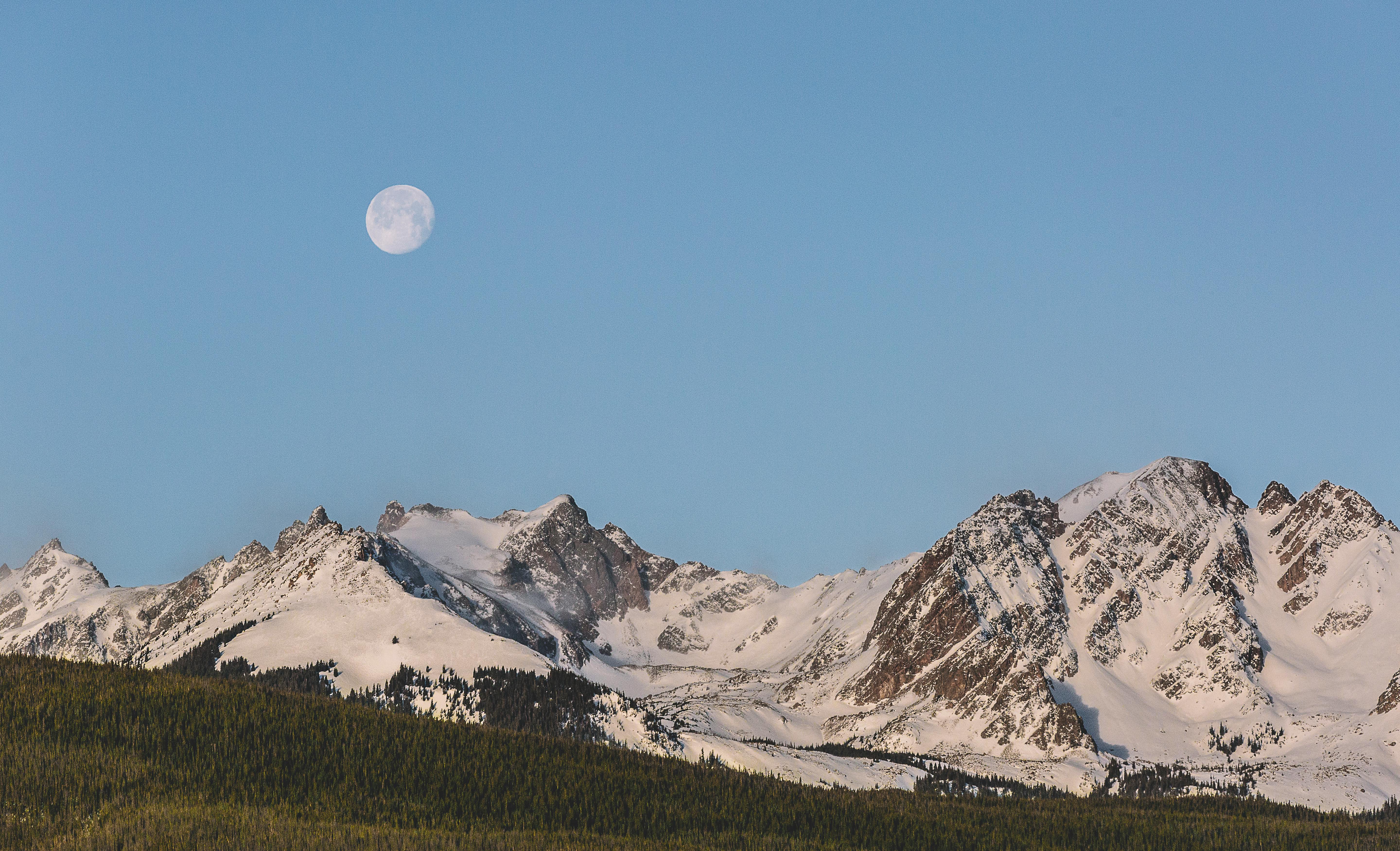 Full Moon over the Snow Covered Mountains · Free Stock Photo