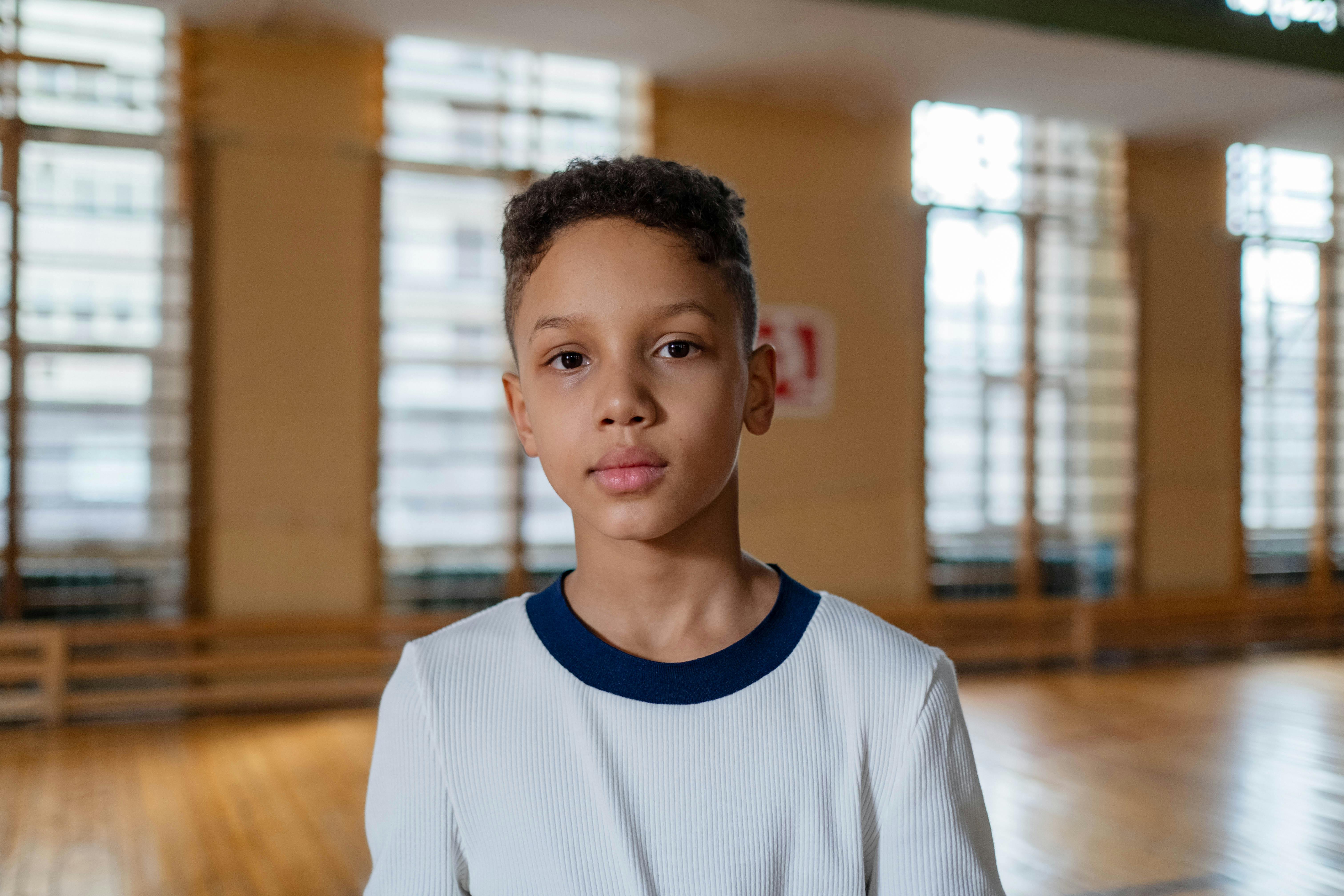 Portrait of a Boy in White Top · Free Stock Photo