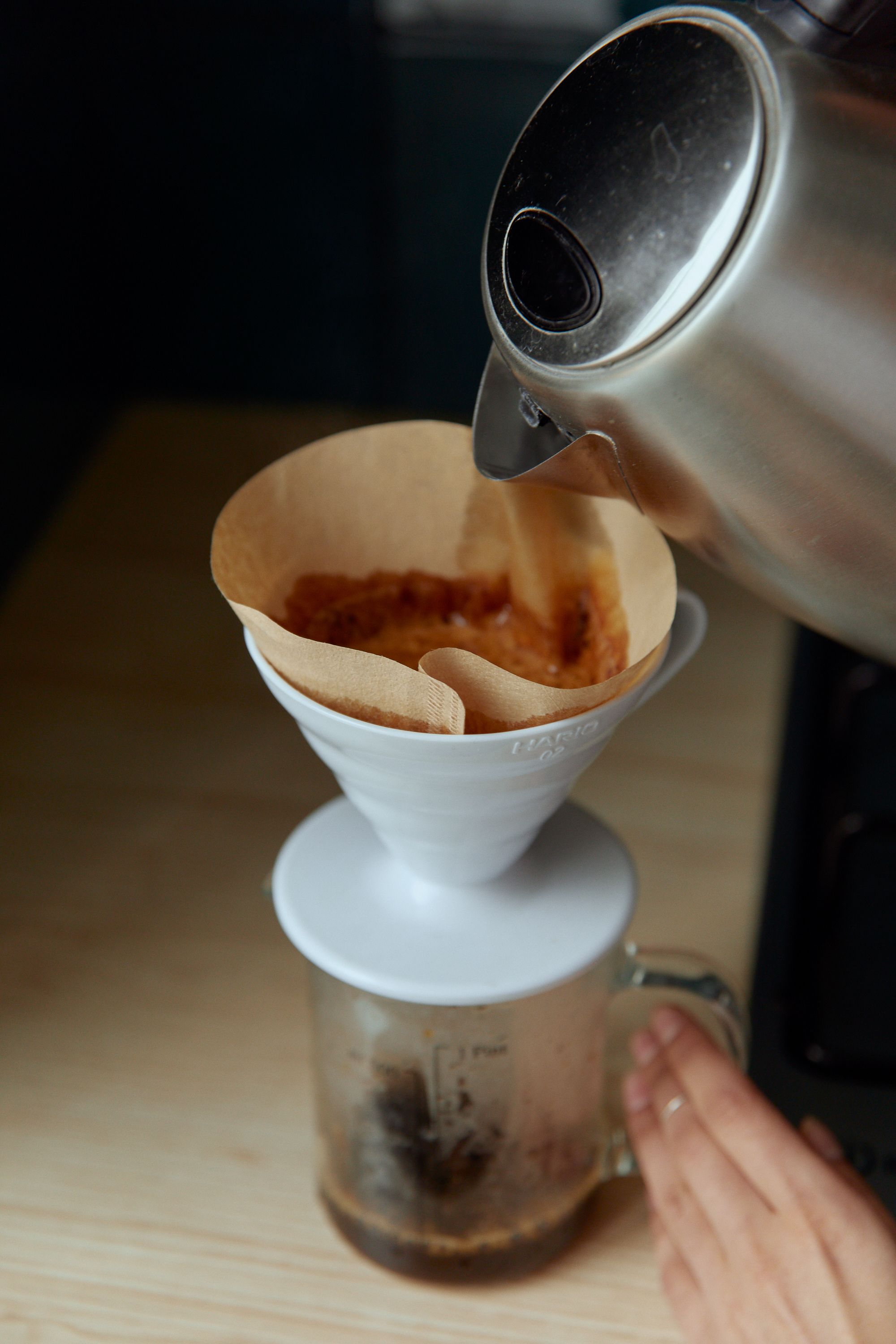 A Person Filtering Coffee · Free Stock Photo