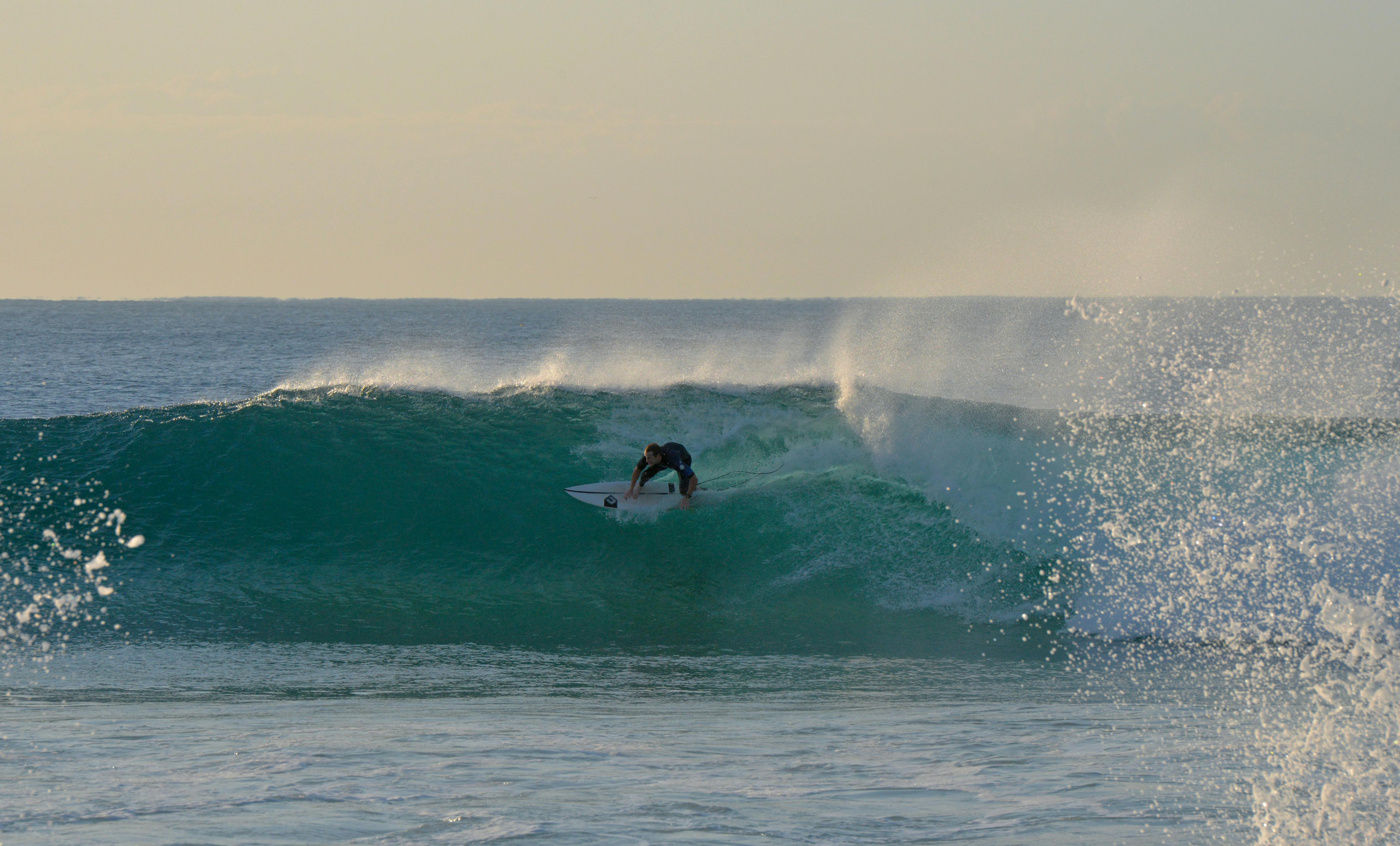 Strong Man Surfing on Sea · Free Stock Photo