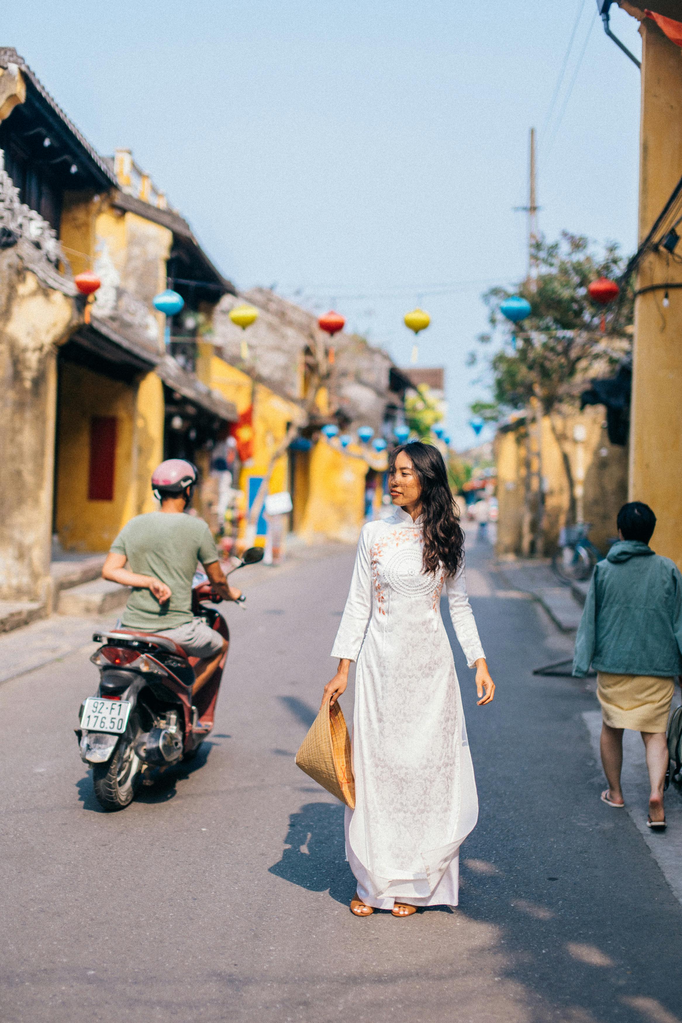 Back View of a Person Wearing Coolie Hat while Sitting on a Raft · Free ...